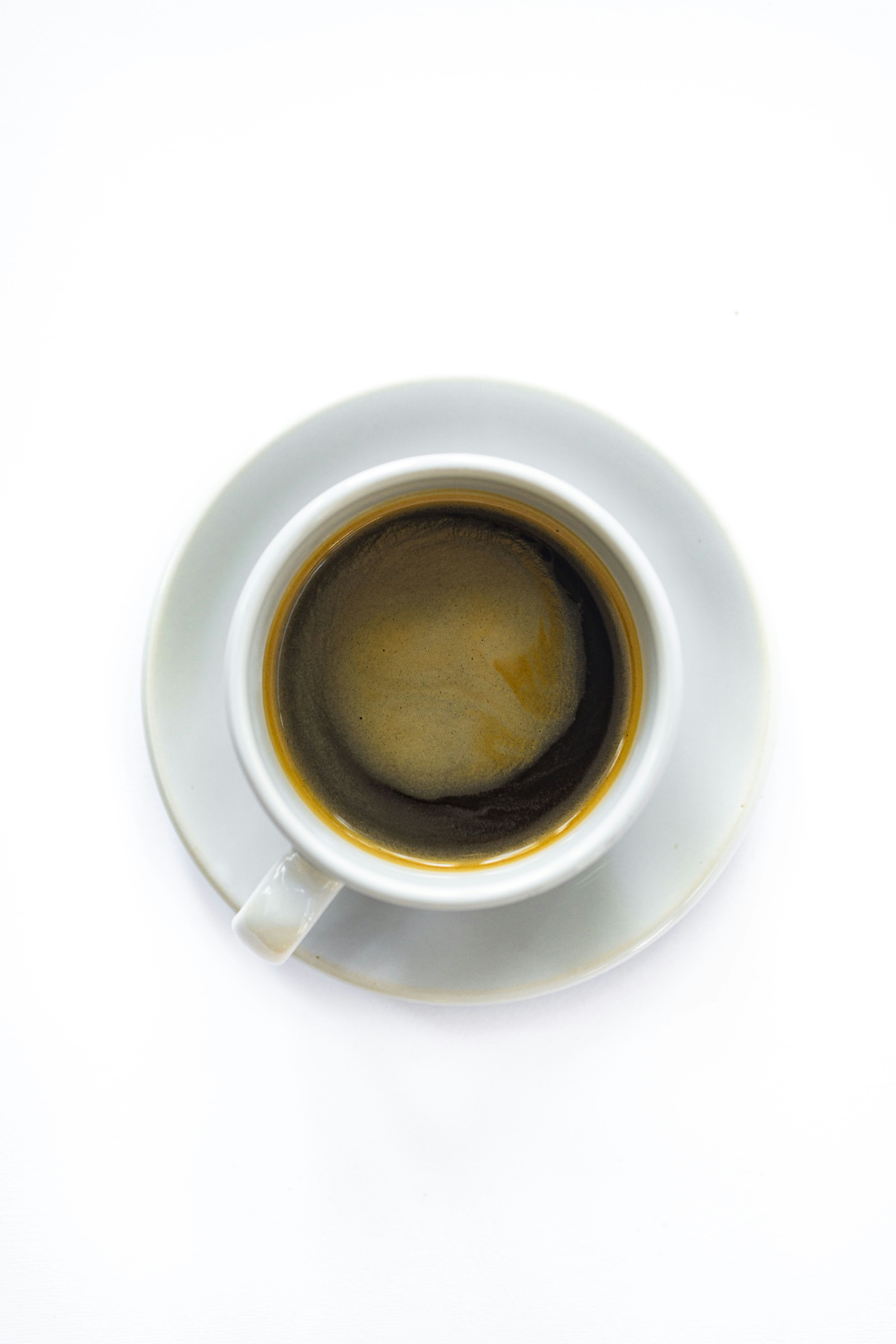 Espresso Ring in a White Cup: A Minimal Coffee Portrait