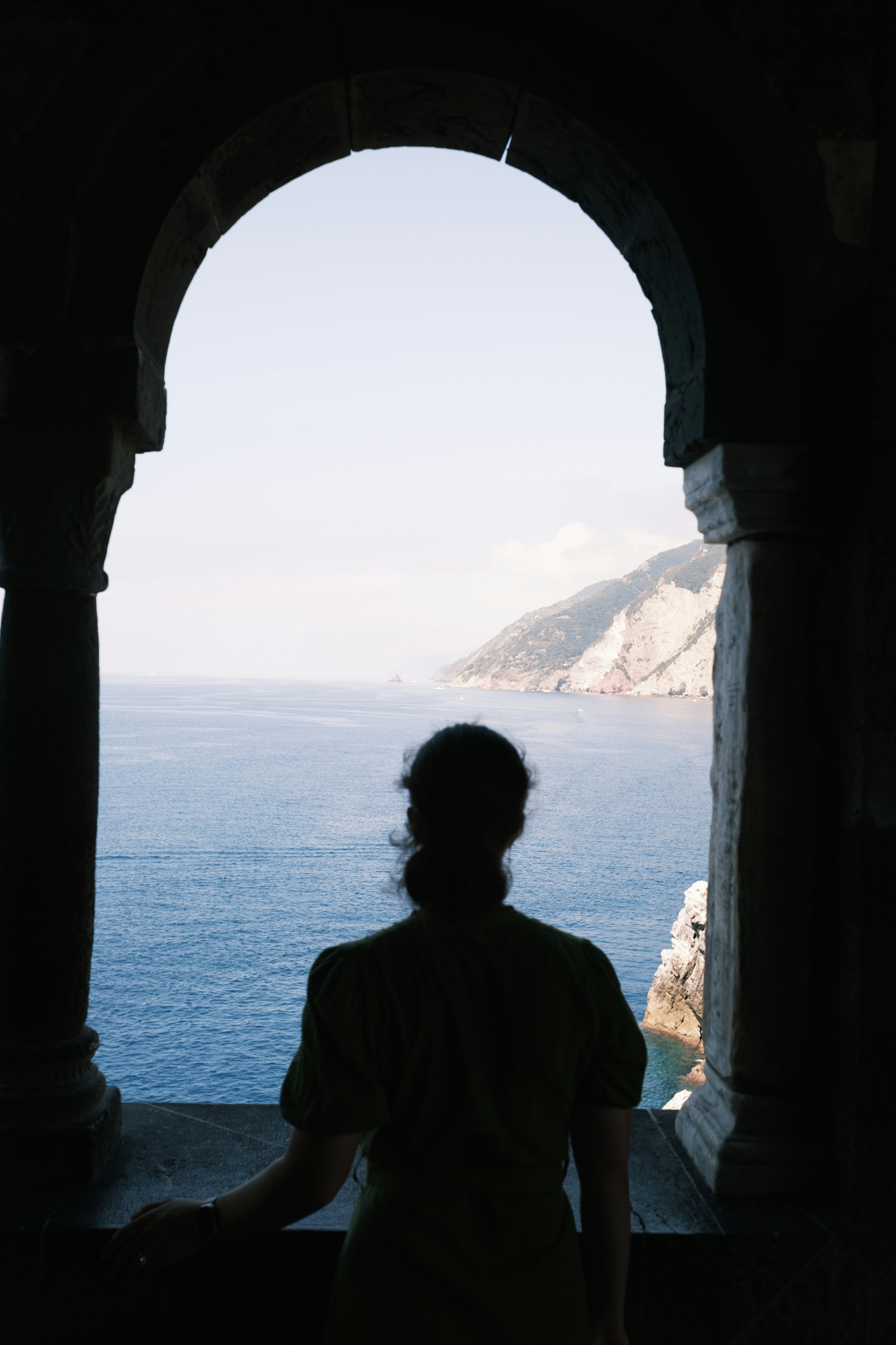 Sea View Through an Ancient Arch: silhouette at the threshold