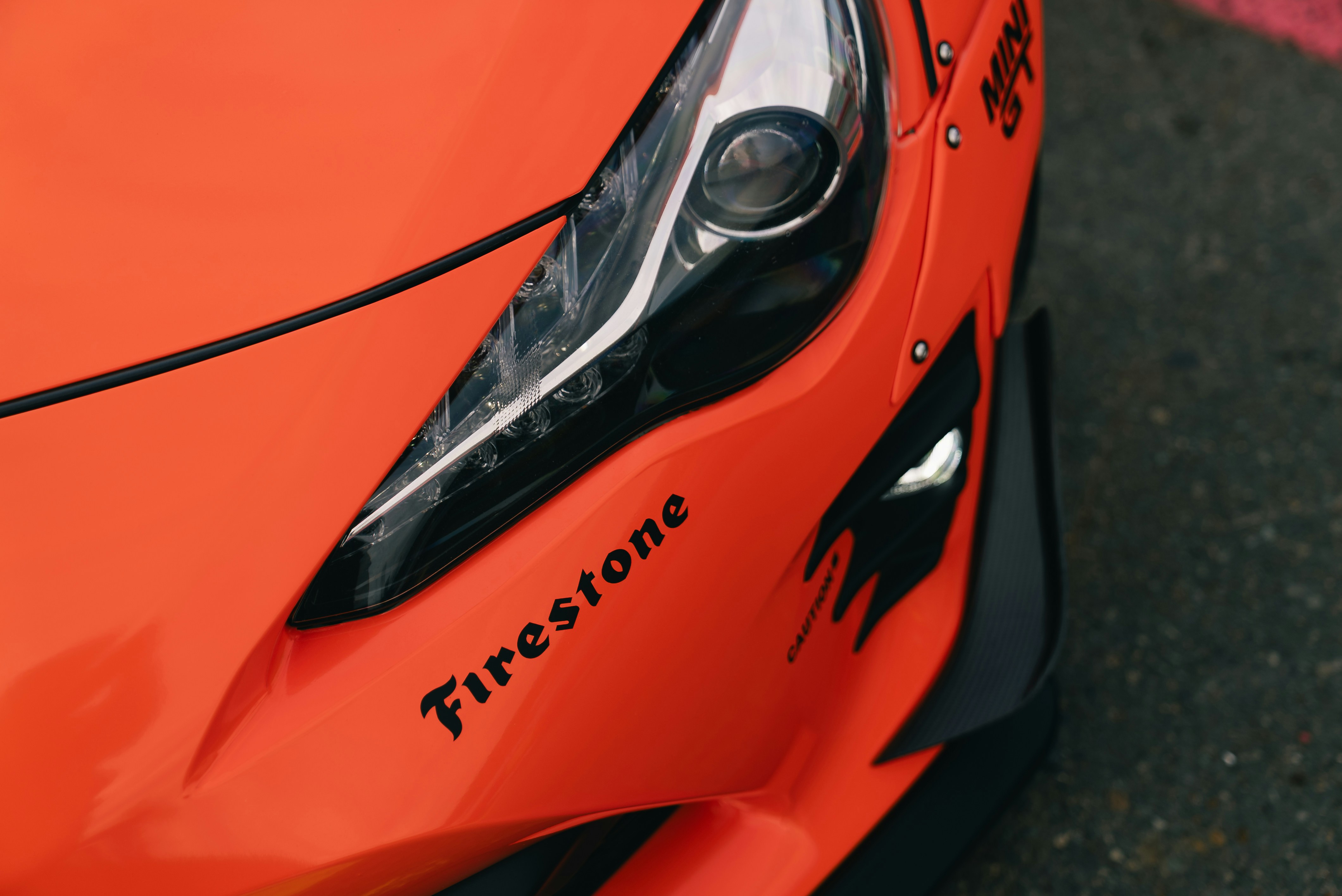 Amber Velocity: a close-up of the racing headlamp and hood branding