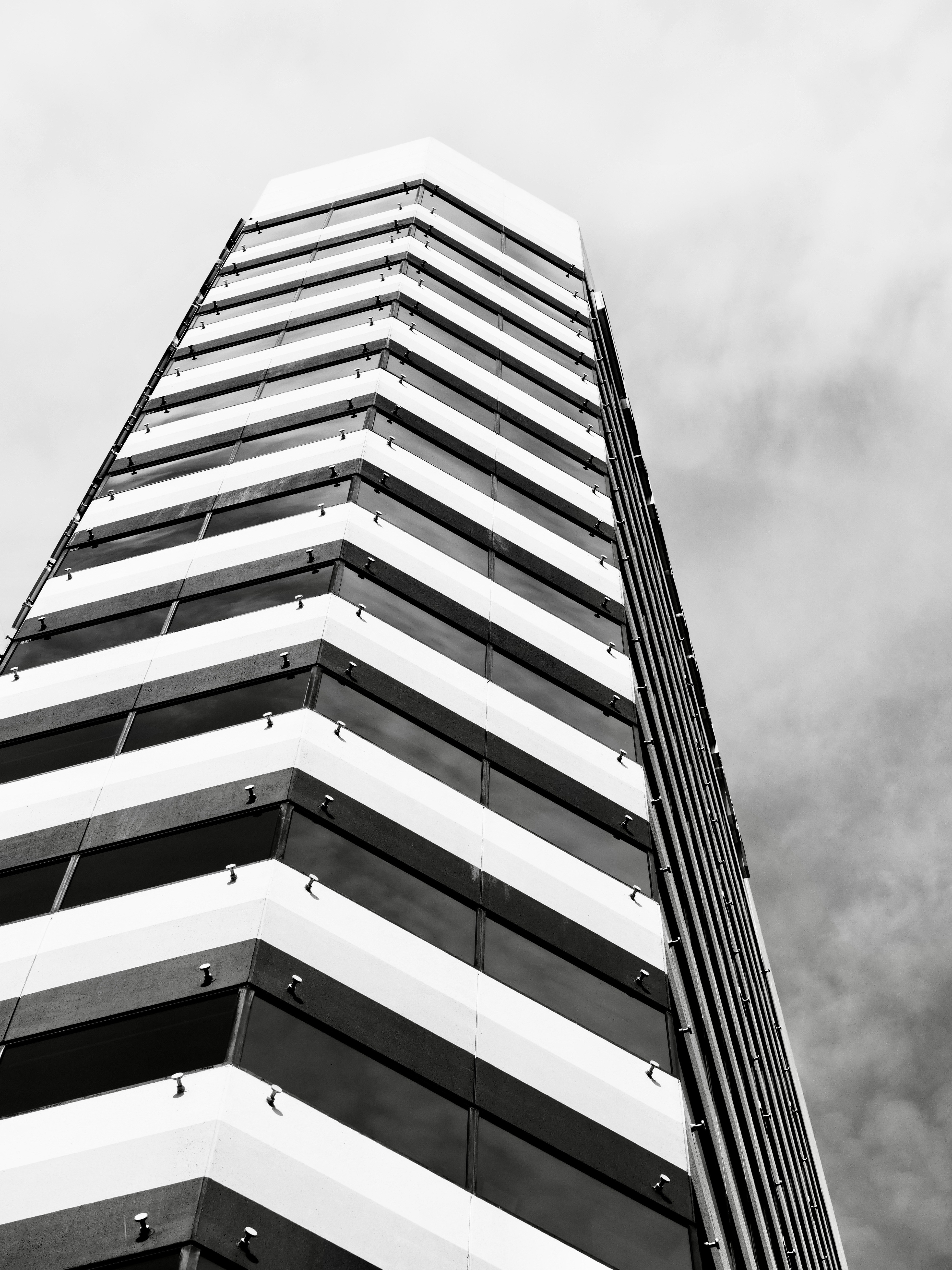 Towering Angles: A Black-and-White Ascent