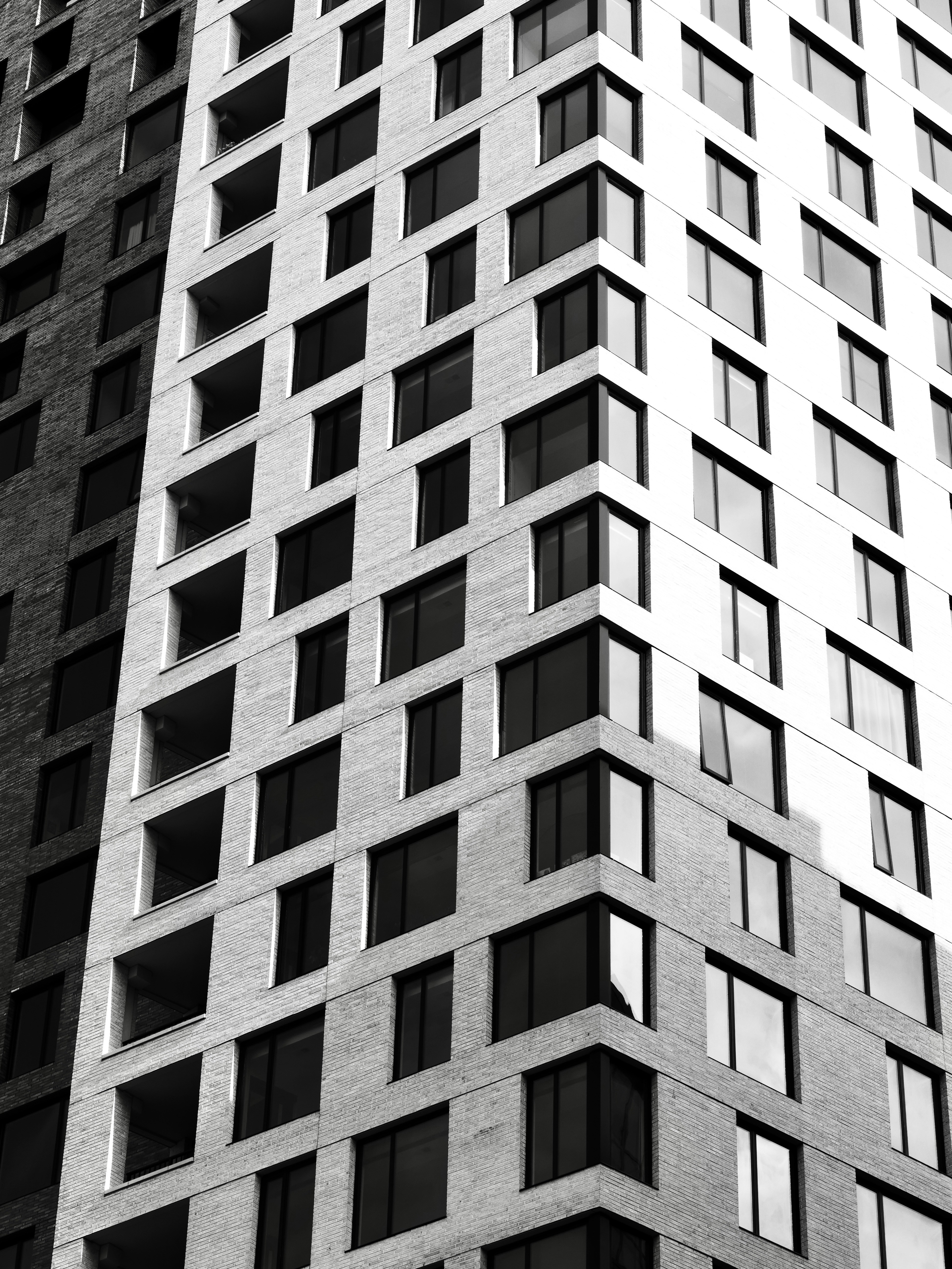 Cornered Geometry: A Facade of Repeating Windows in Monochrome Precision
