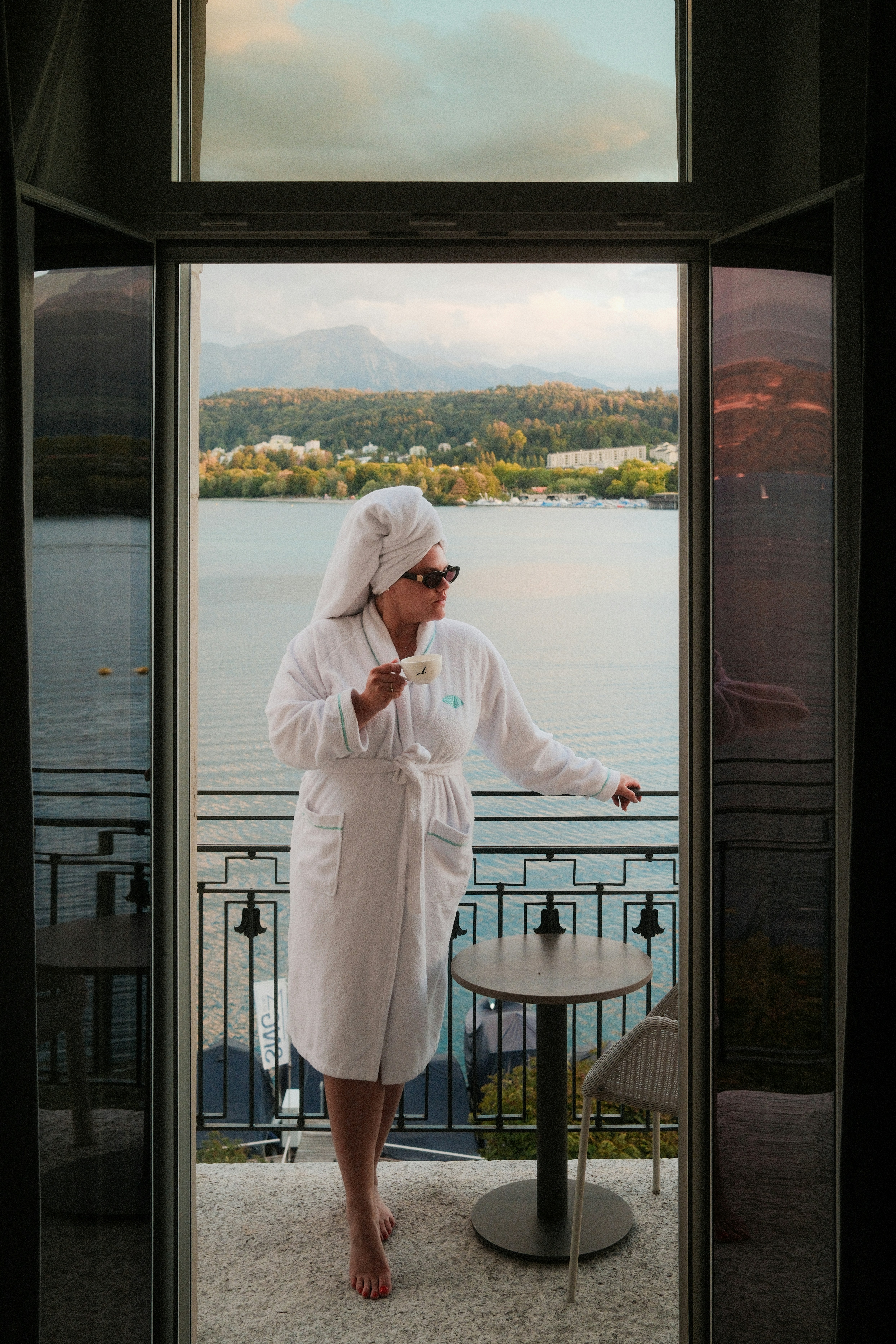 Tea on the Terrace: A Quiet Moment by the Lake