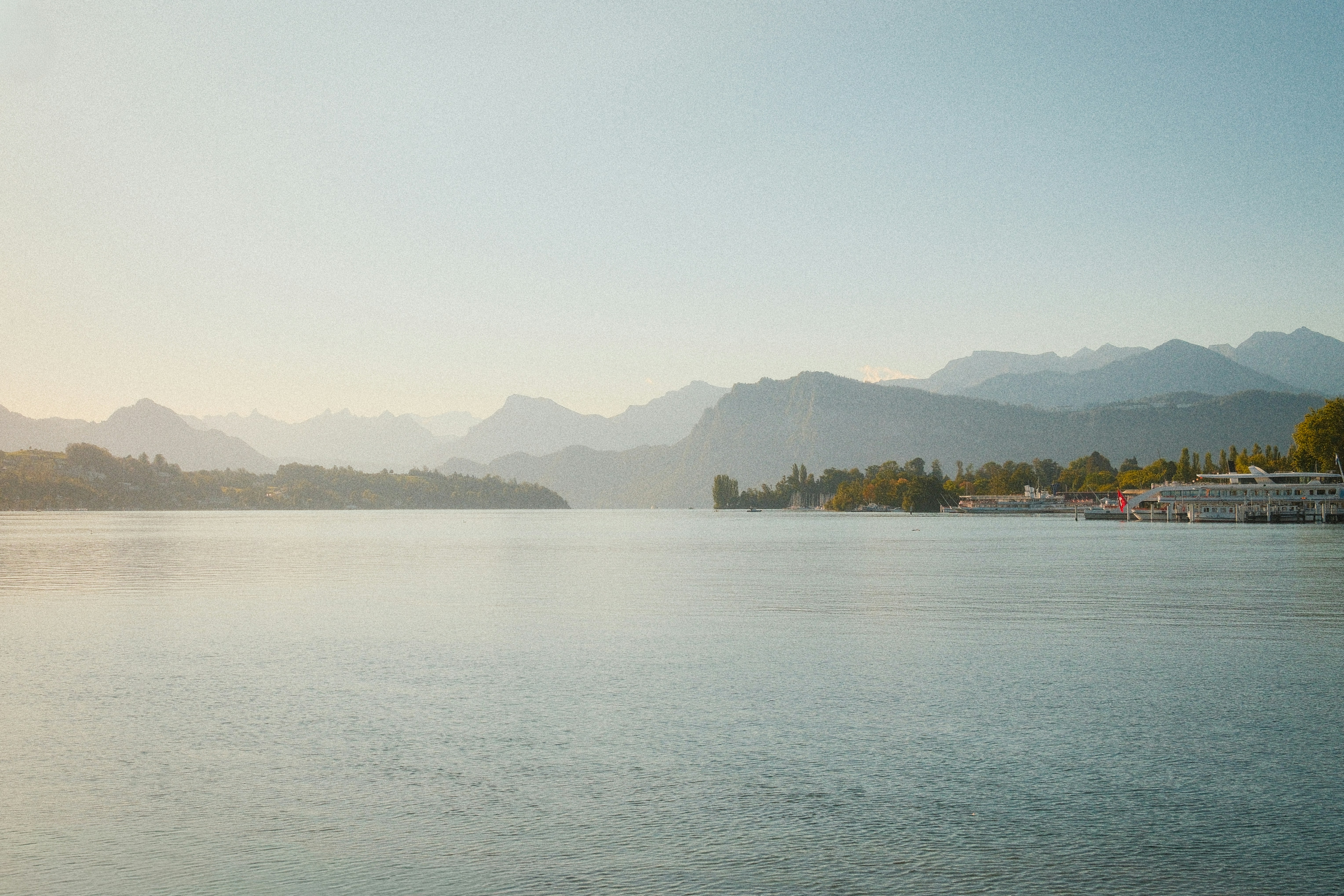 Silent Lake under a Cascade of Misty Mountains