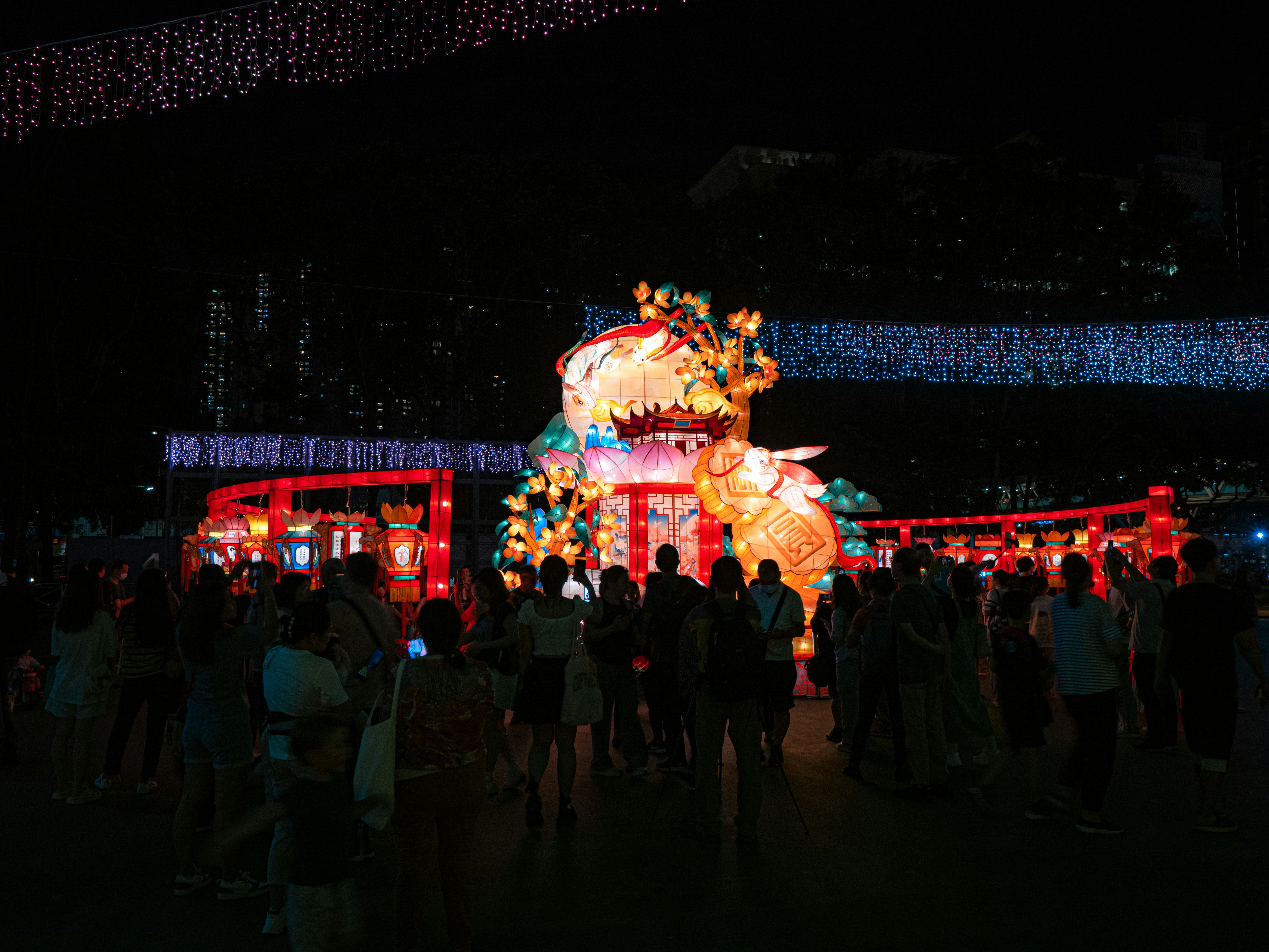 Luminescent Dragon Lanterns: Night Parade Through a Street of Glow