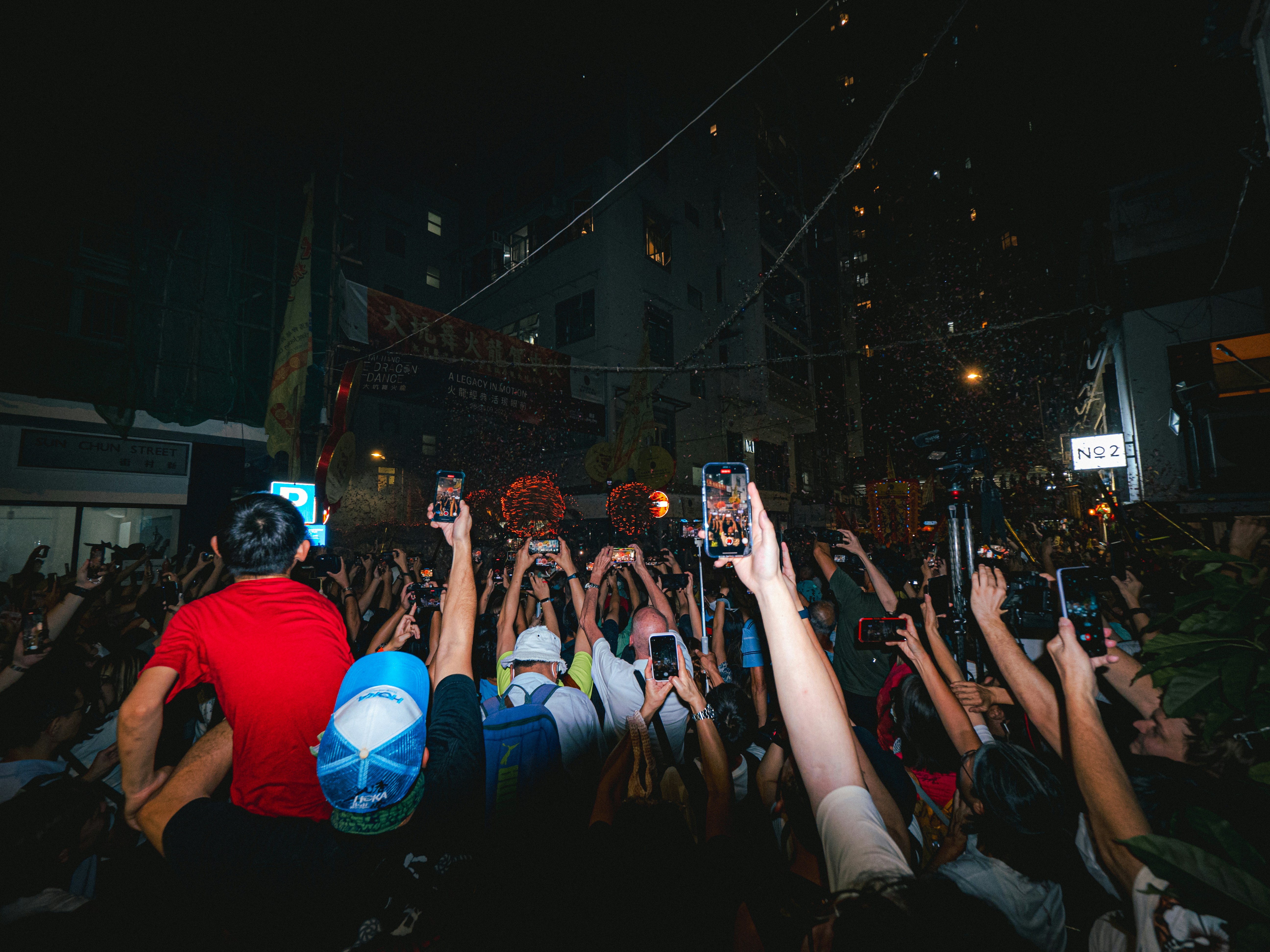 Midnight Pulse: A City Crowd Captures the Stage Lights