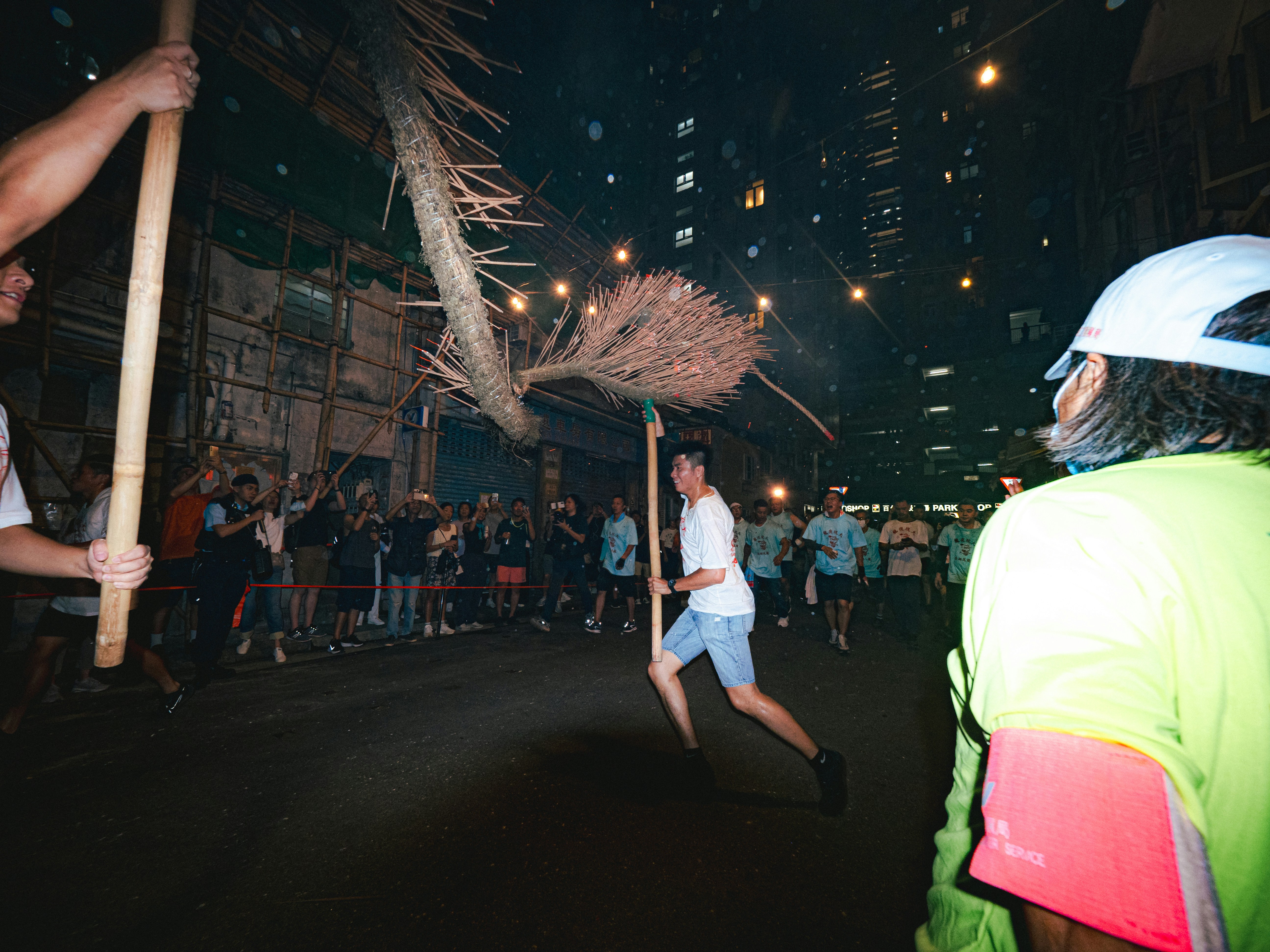 Midnight Parade: The Broom-Tossing Dash Under City Lights