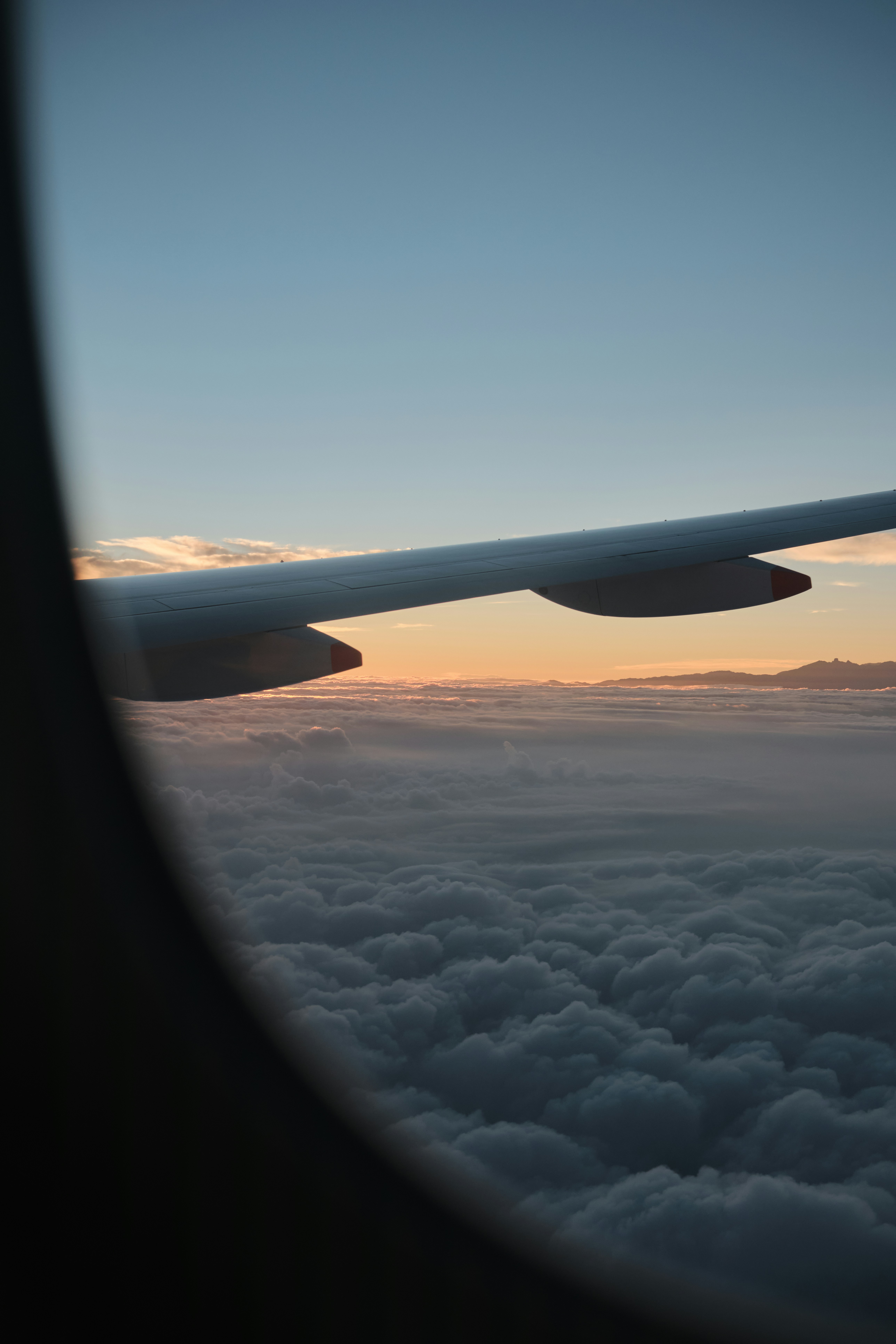 Sunset Wingline: Cloudscape from a Moving Window