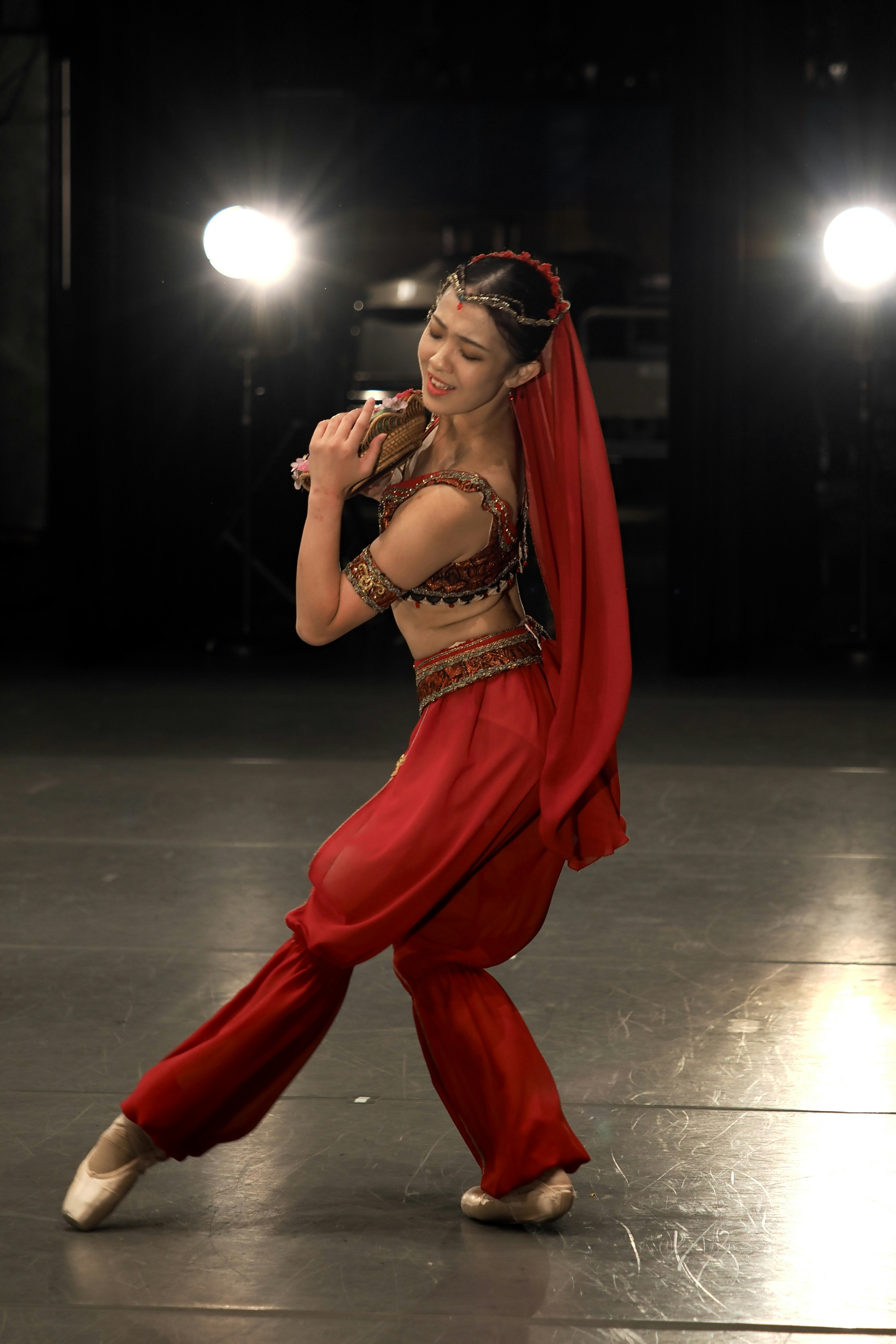 Red Silk in Motion: A Dancer’s Poise on Stage