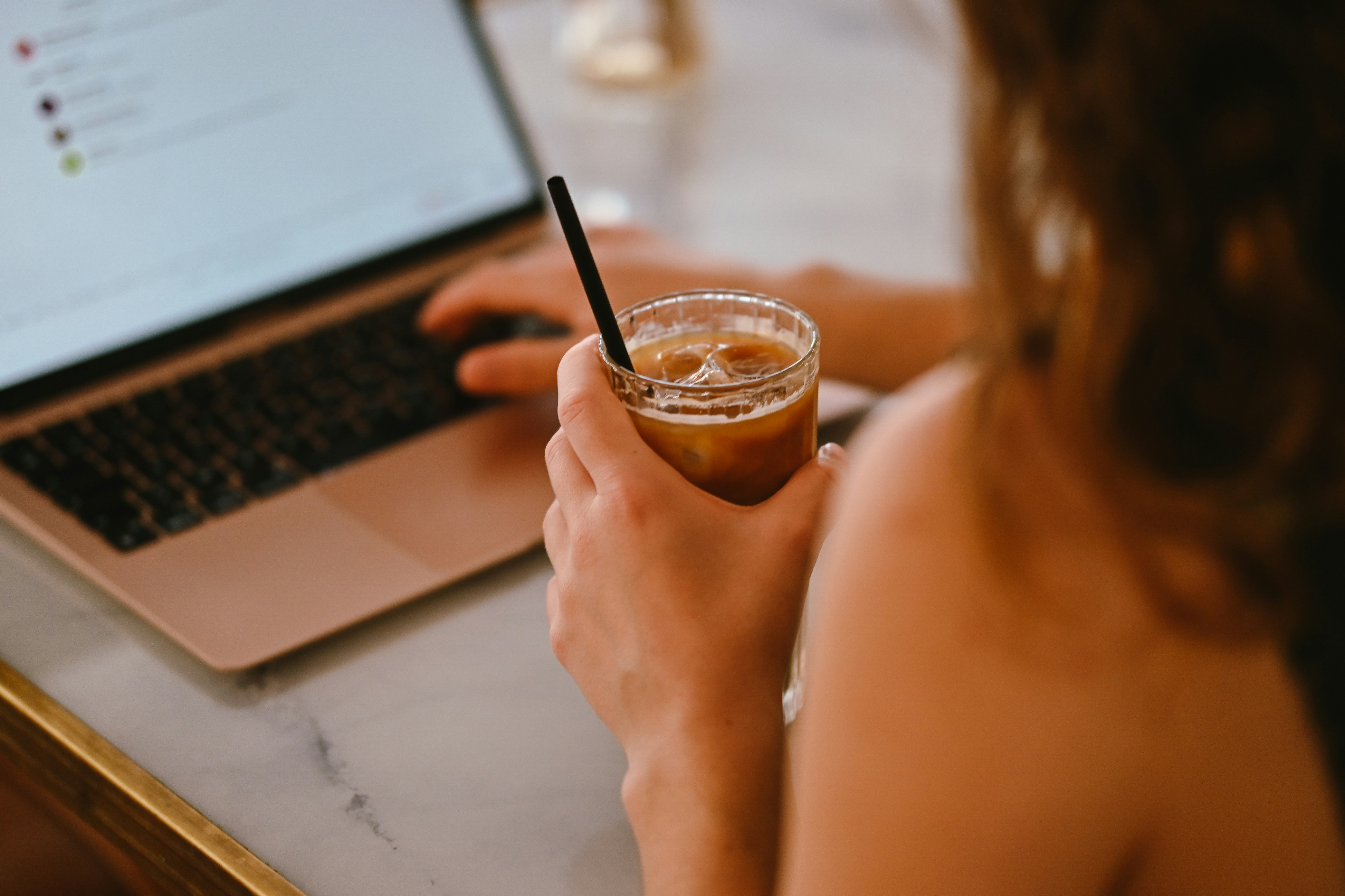 Late-afternoon Brew: Focus on the Hand and Glass
