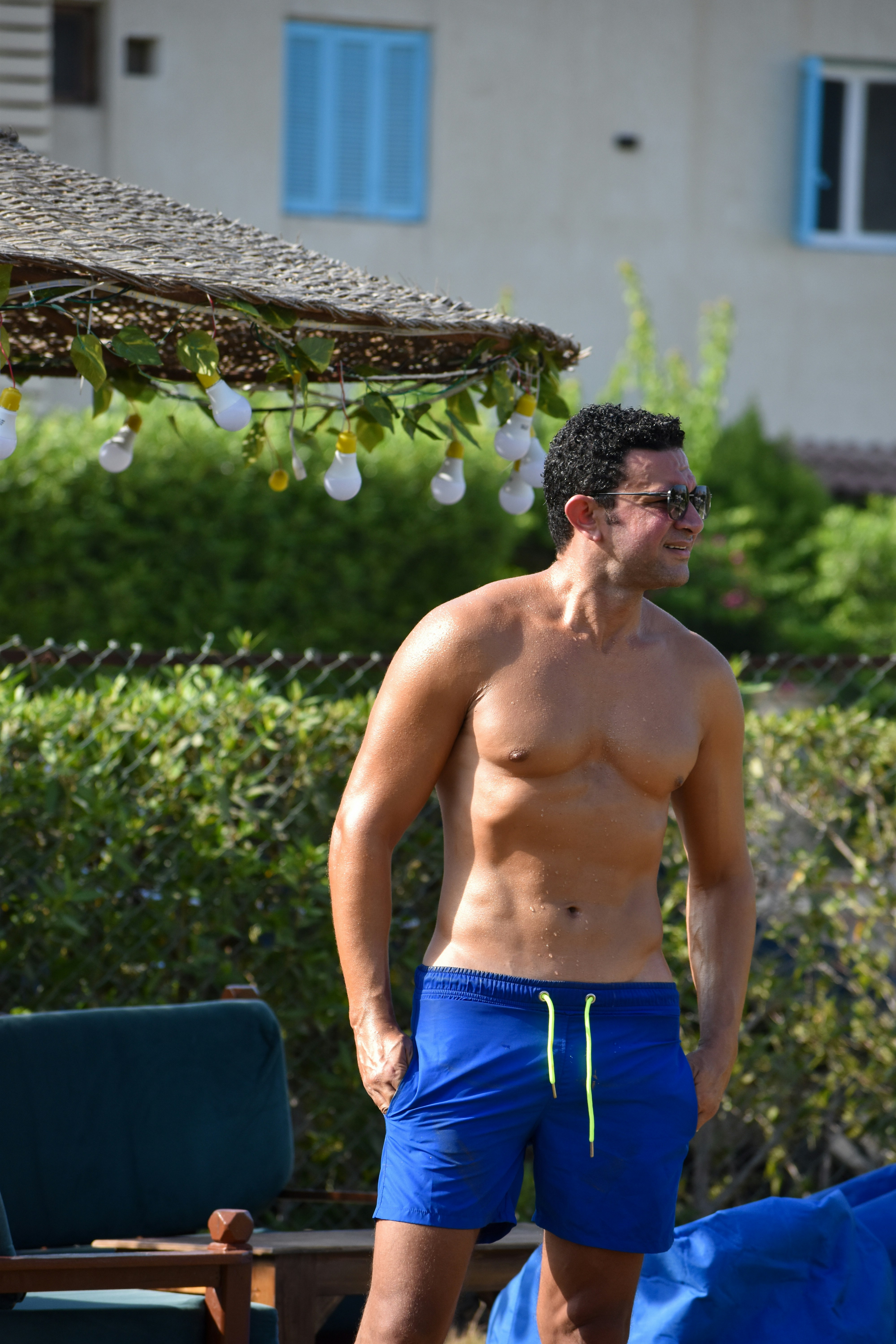 Sunlit Surfer in a Quiet Backyard Oasis