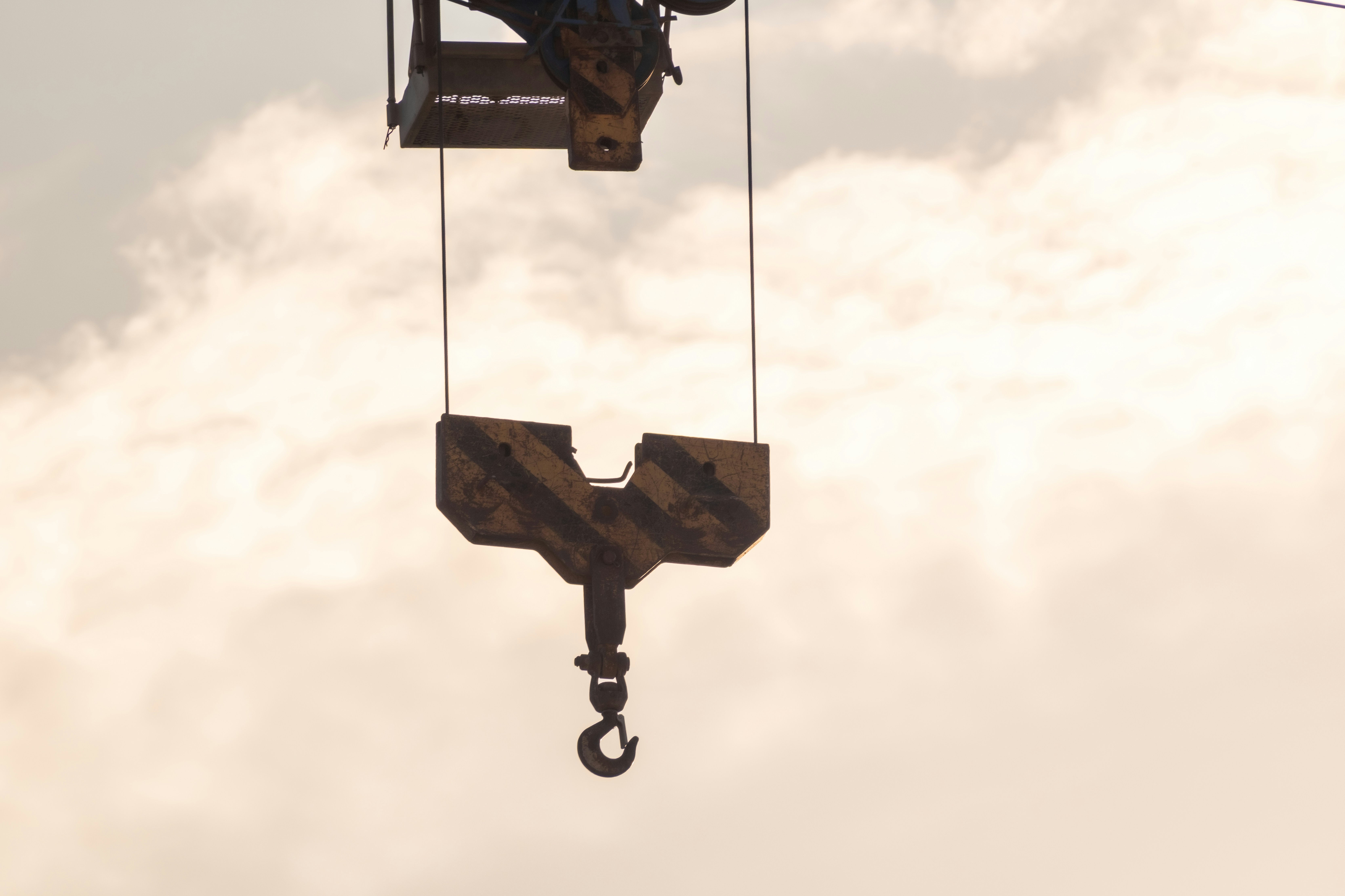Crane Hook Reaches into the Cloudscape