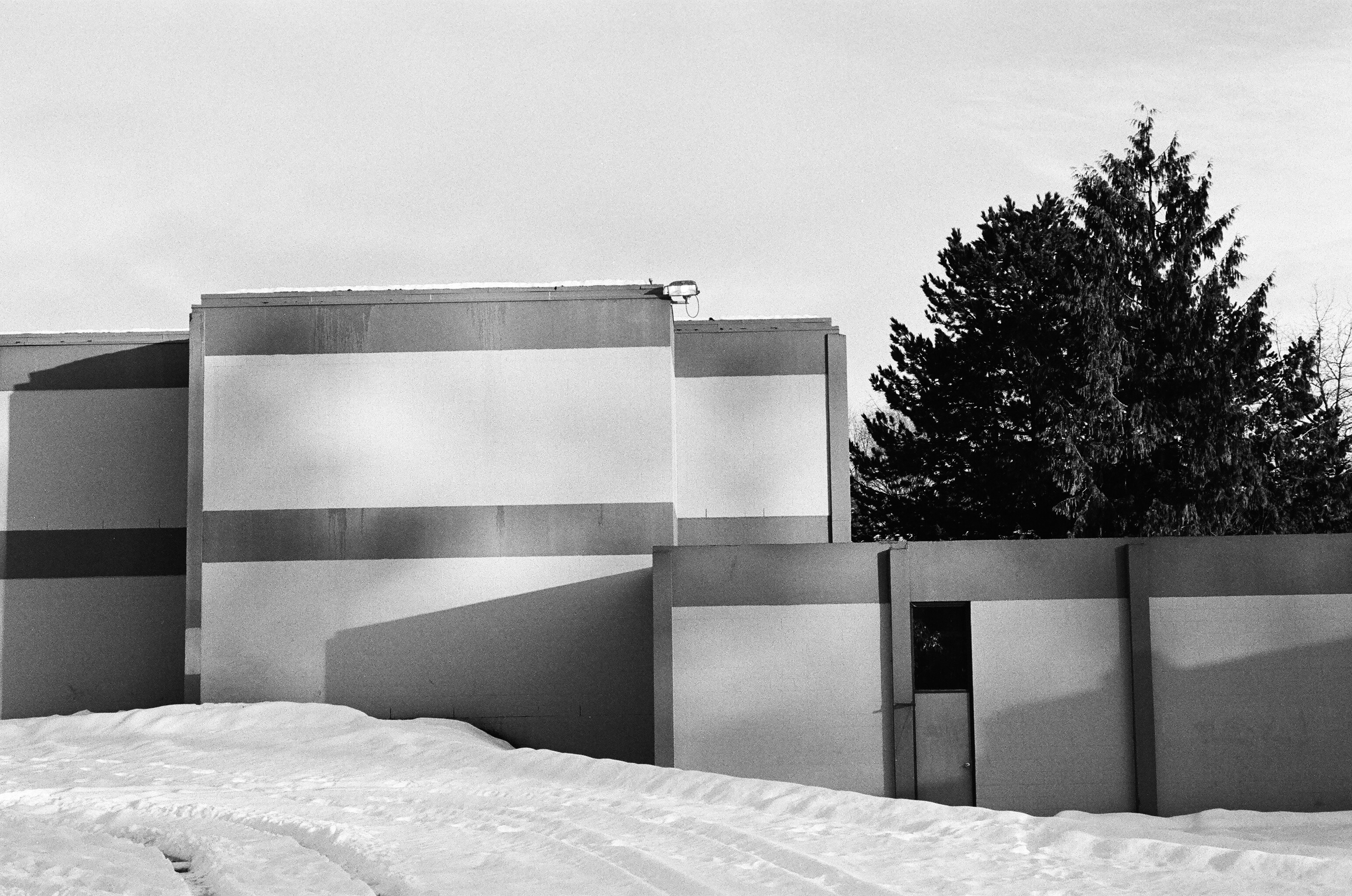 Snowbound Geometry: Modernist Wall Panels under Winter Light