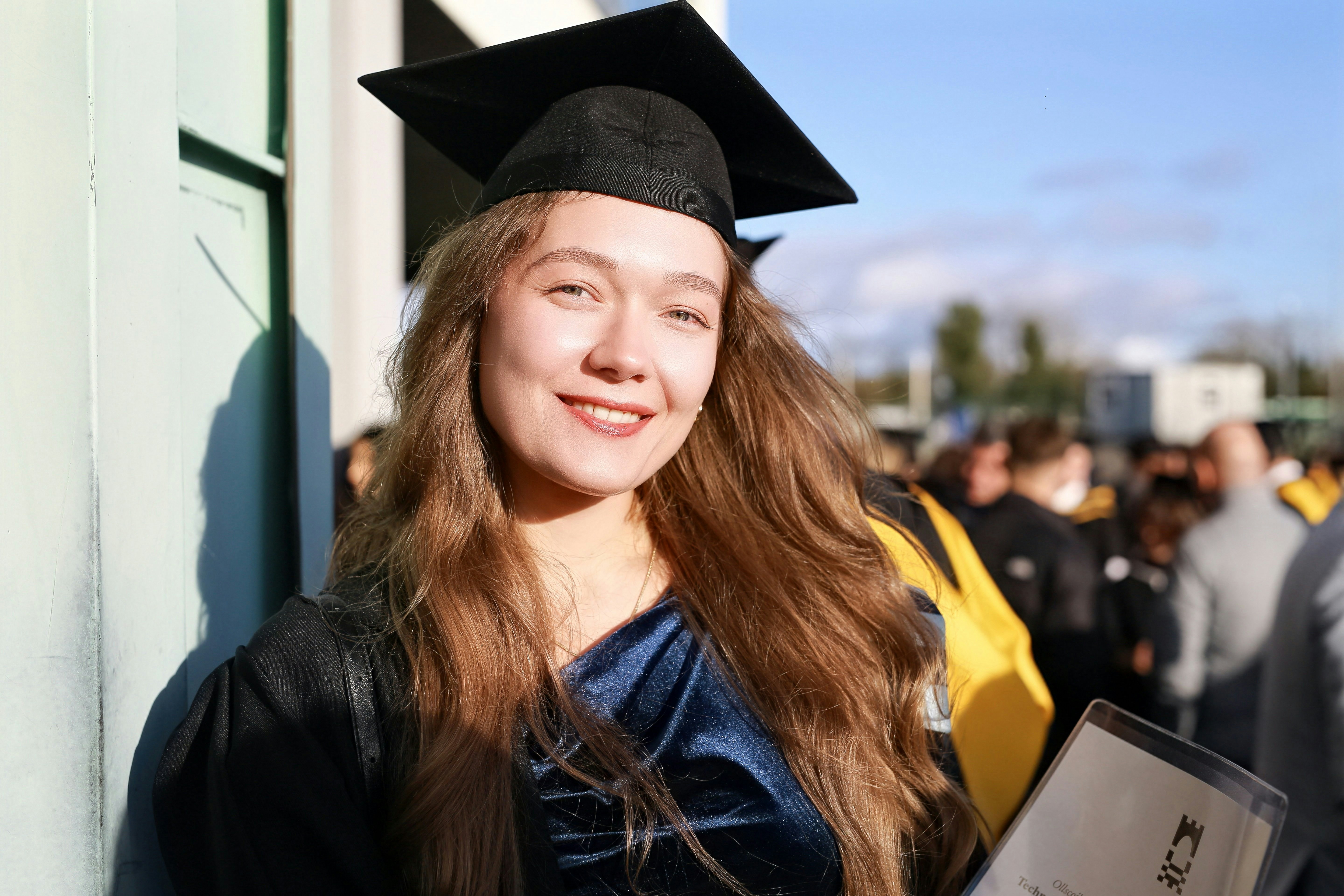 Graduation Glow: A Joyful Graduate in Focus