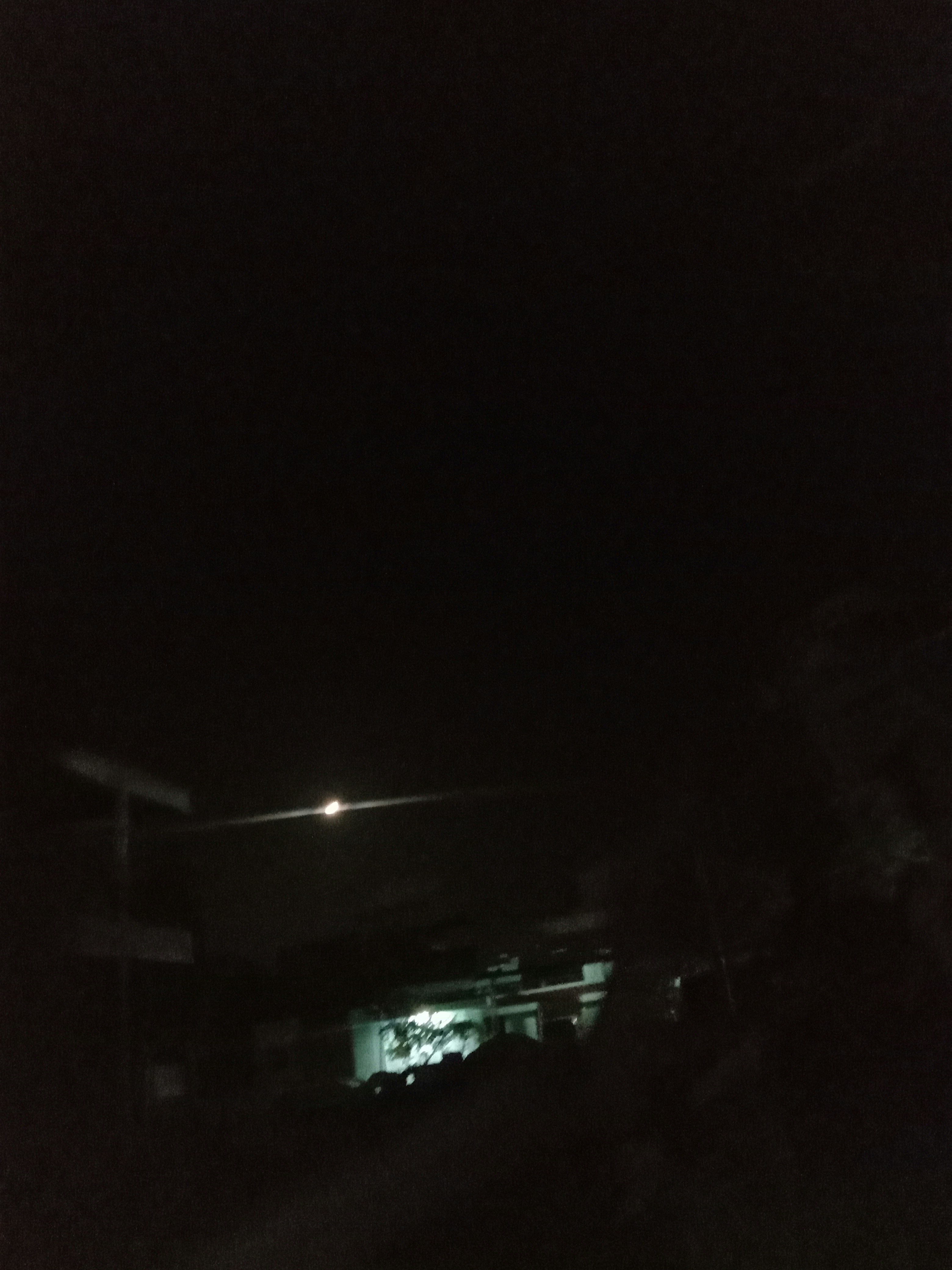Night Streetlight over Quiet Urban Silhouette