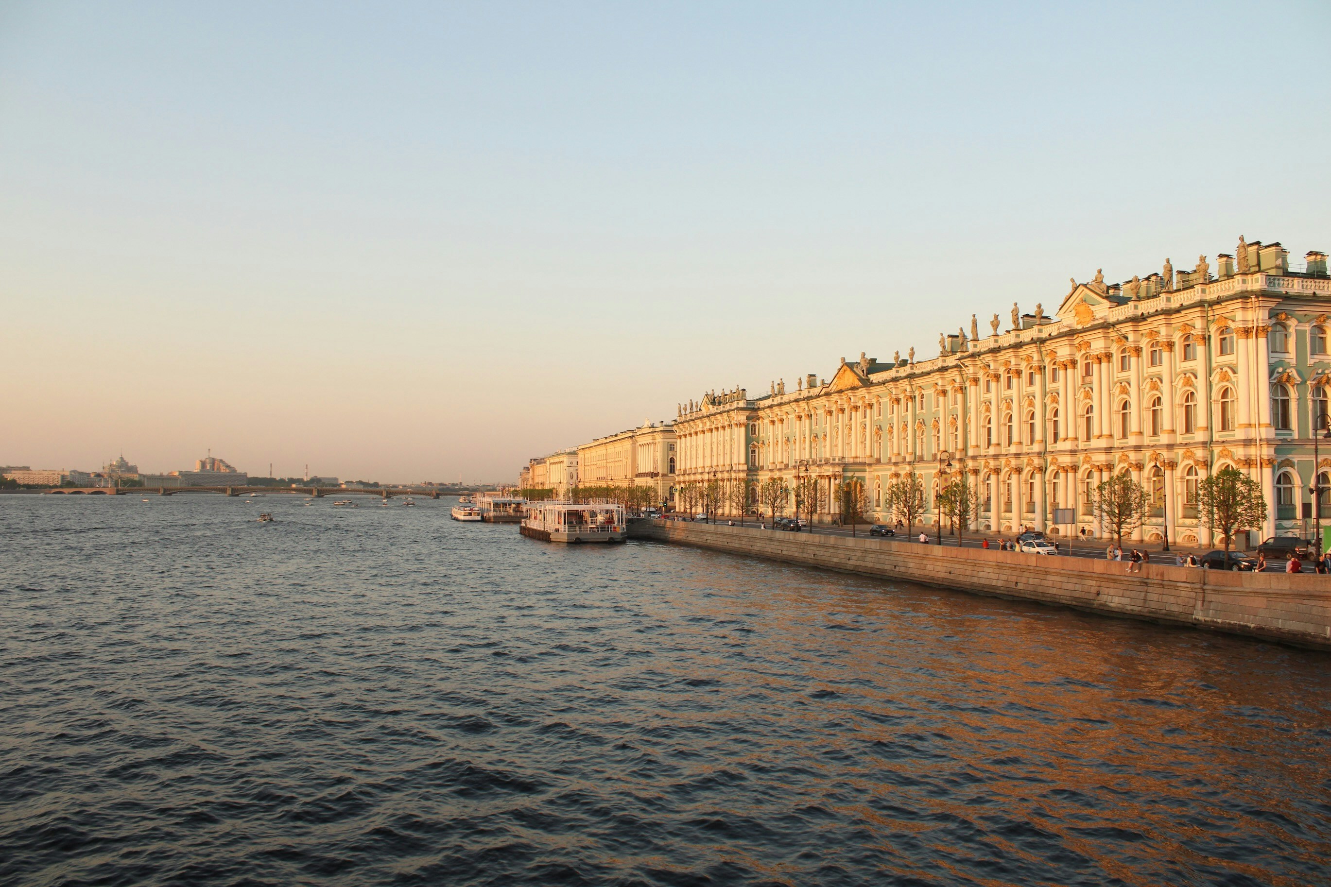 Sunlit Neoclassical Wharf: A Seamless Waterfront Panorama