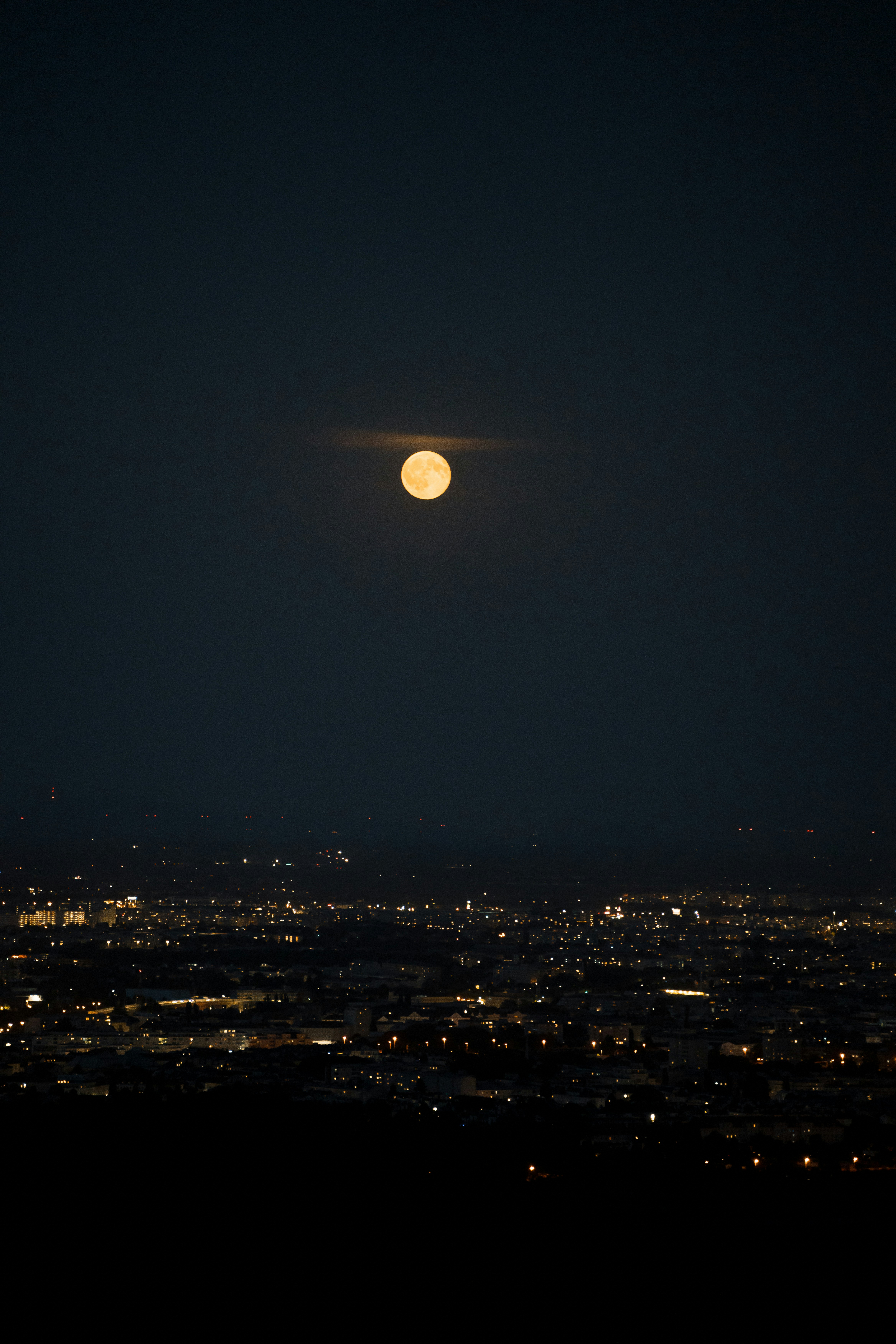 Moonlight Over the Distant City