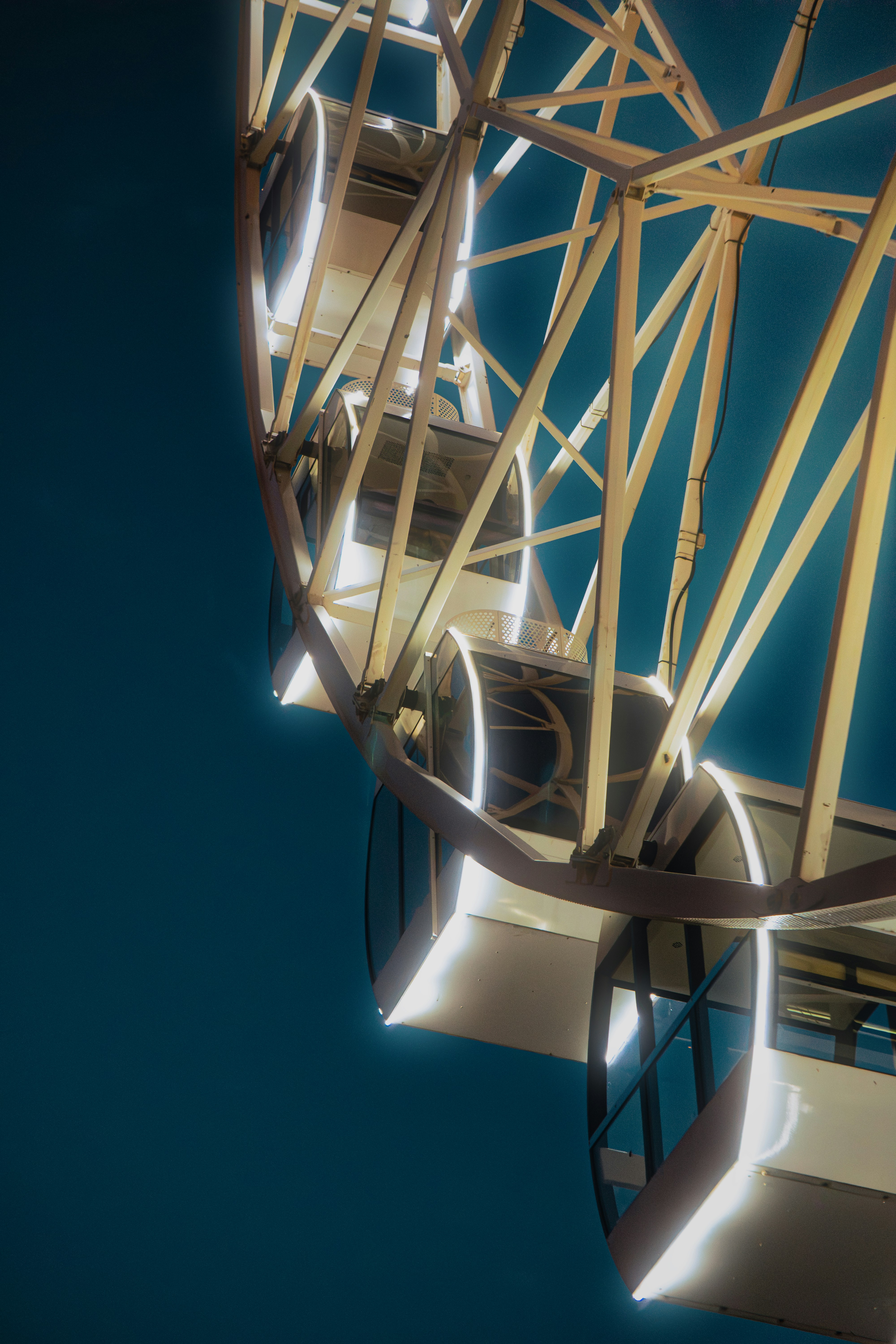 Spiral of Light: Carbon Frame Ferris Wheel in Neon Night