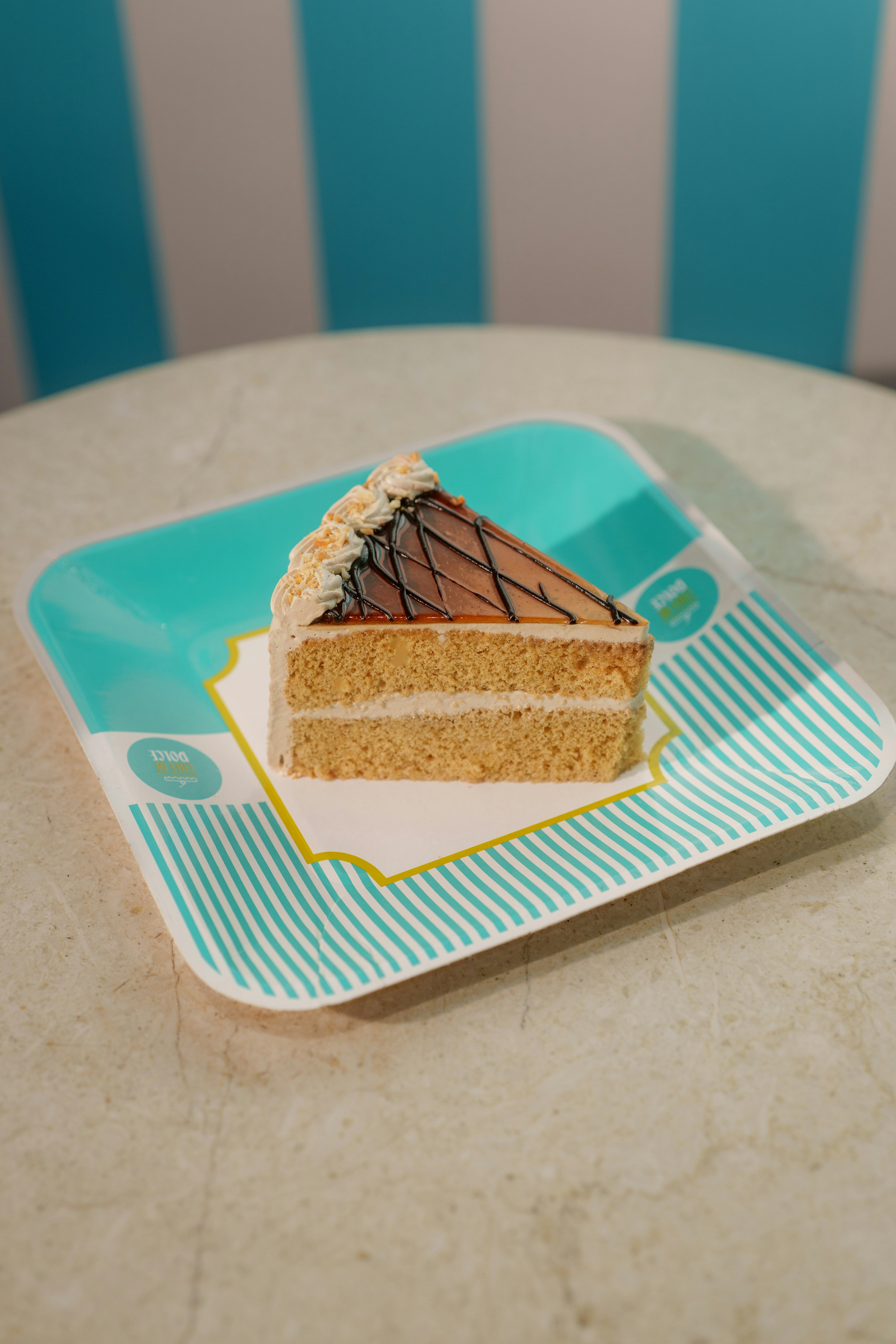 Slice of Dessert, Center Stage on a Mint-Blue Plate