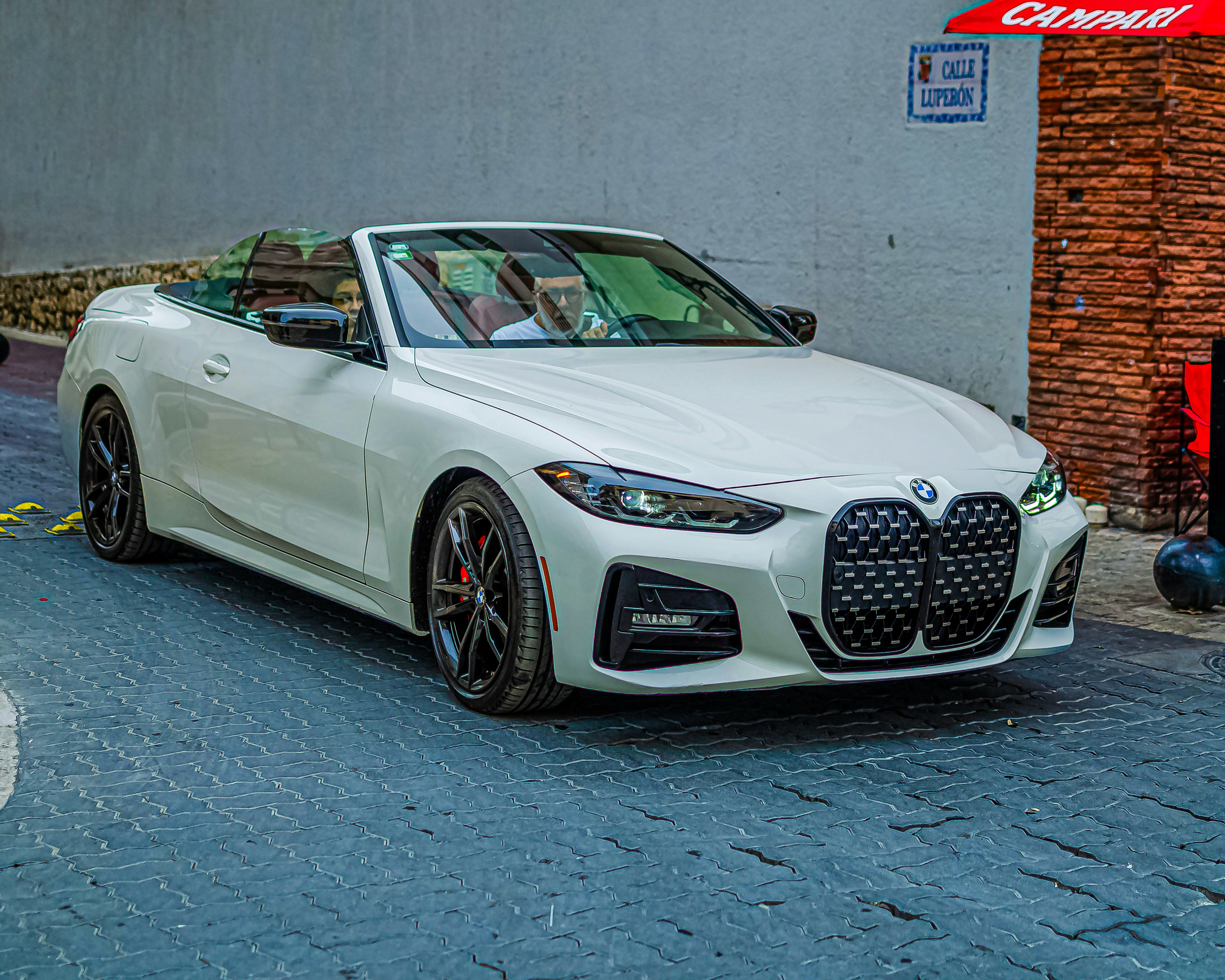White BMW Convertible at the Intersection of Street and Style