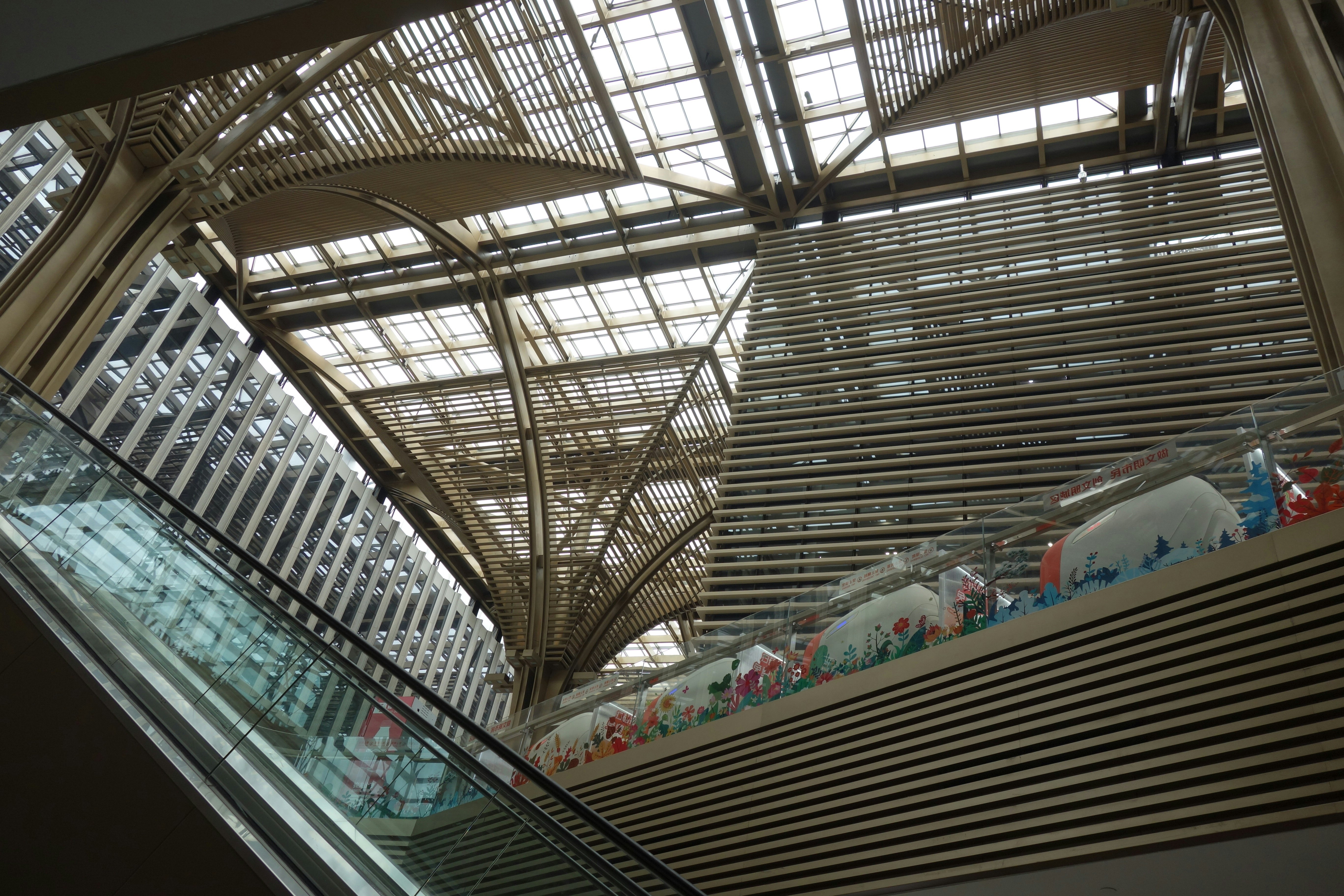 Glass Cathedral: A Tilted Journey Through an Atrium Canopy