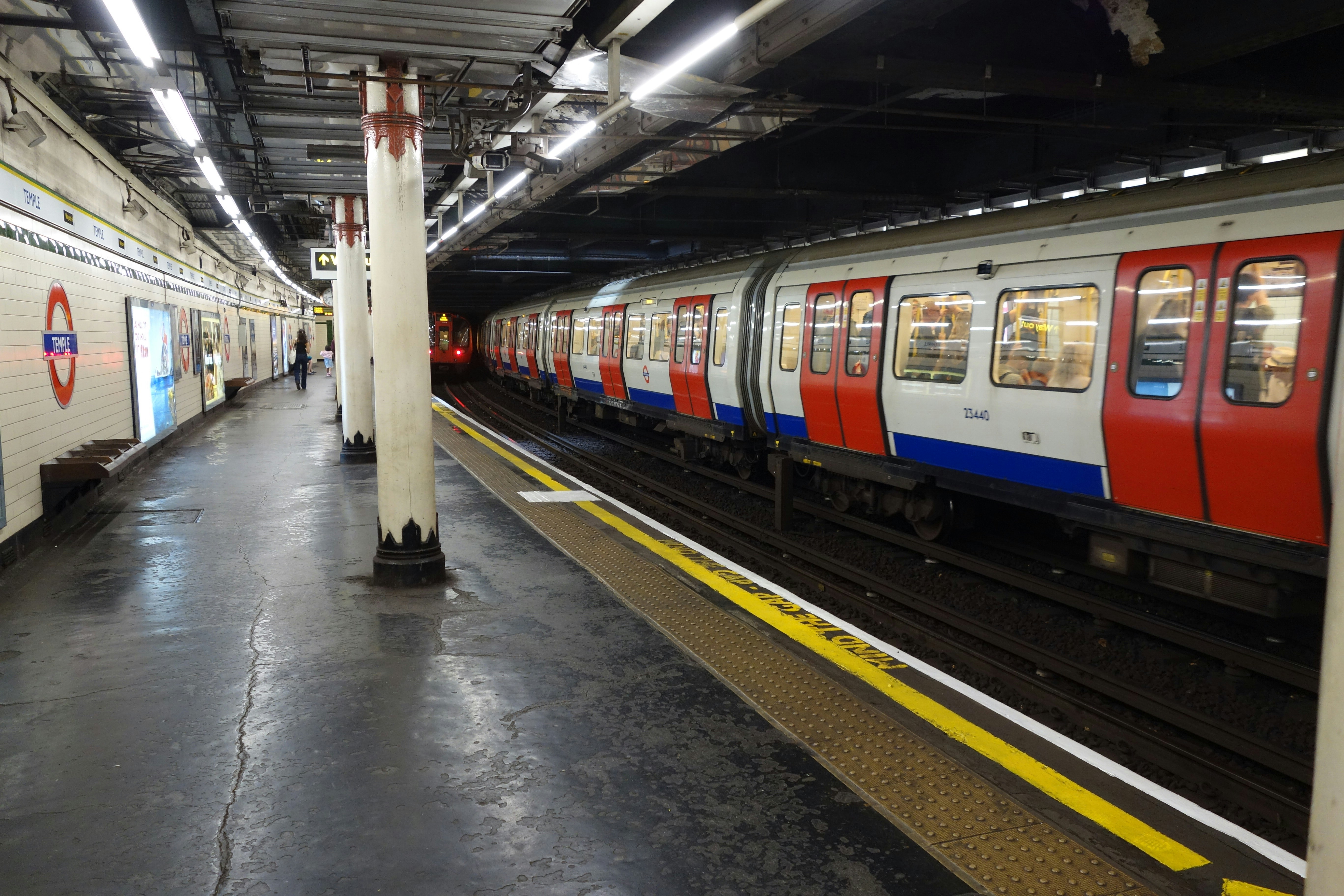 Chrome and Carriage: The London Underground Platform at Dusk