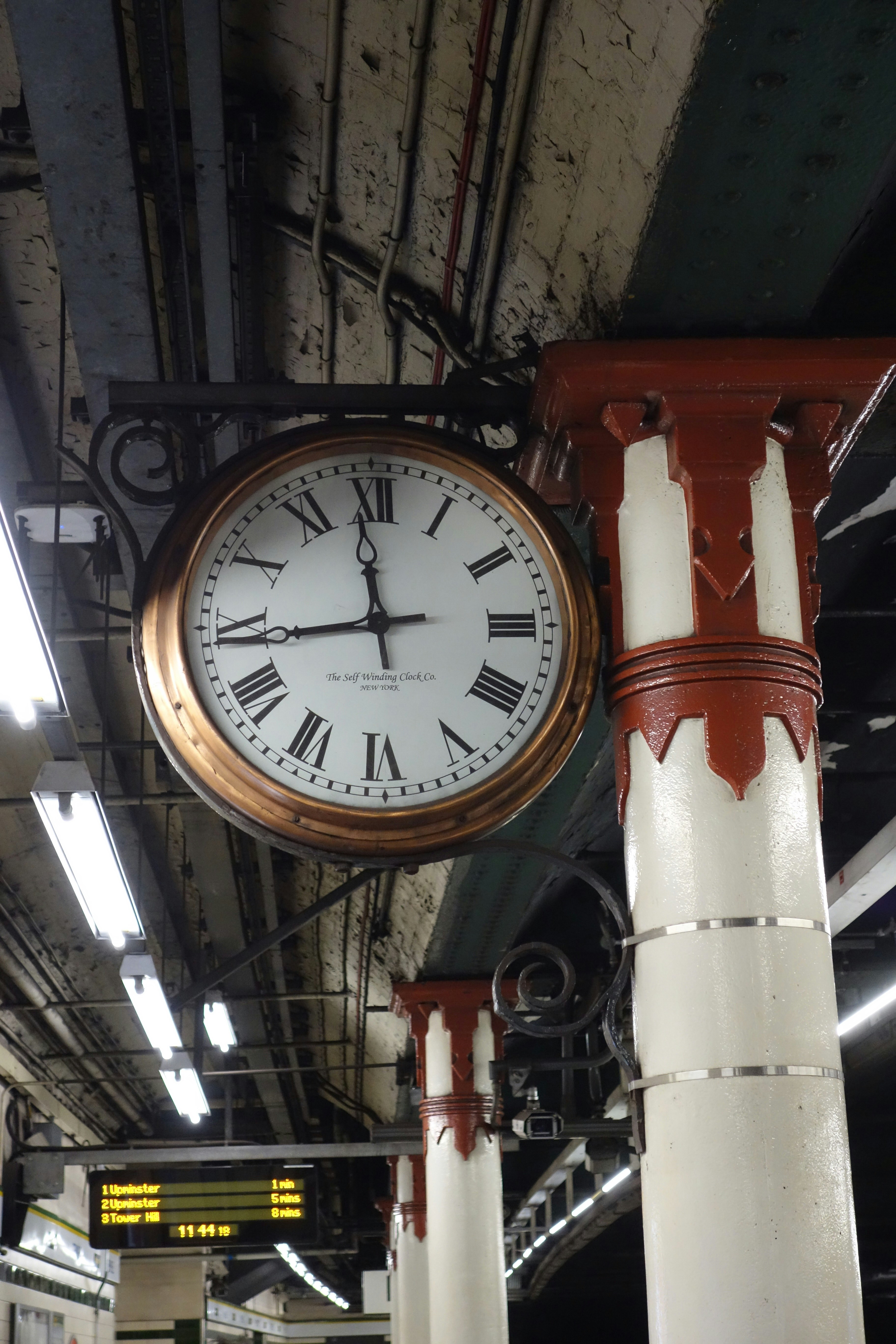 Timeless Face of Time: Clock on a Station Pillar