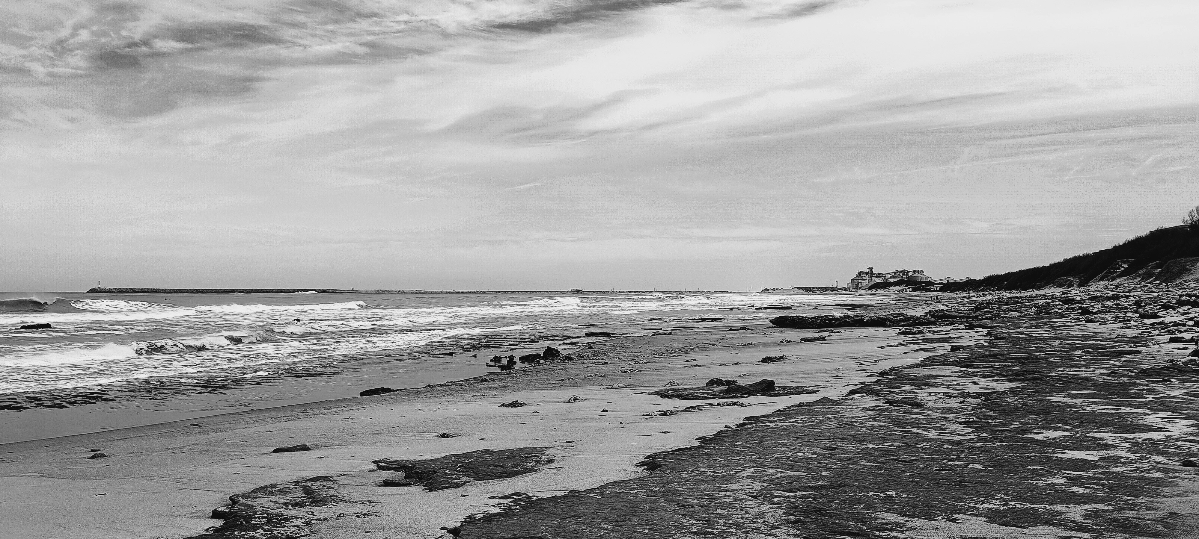 Quiet Shoreline in Monochrome: A Horizon in Stillness