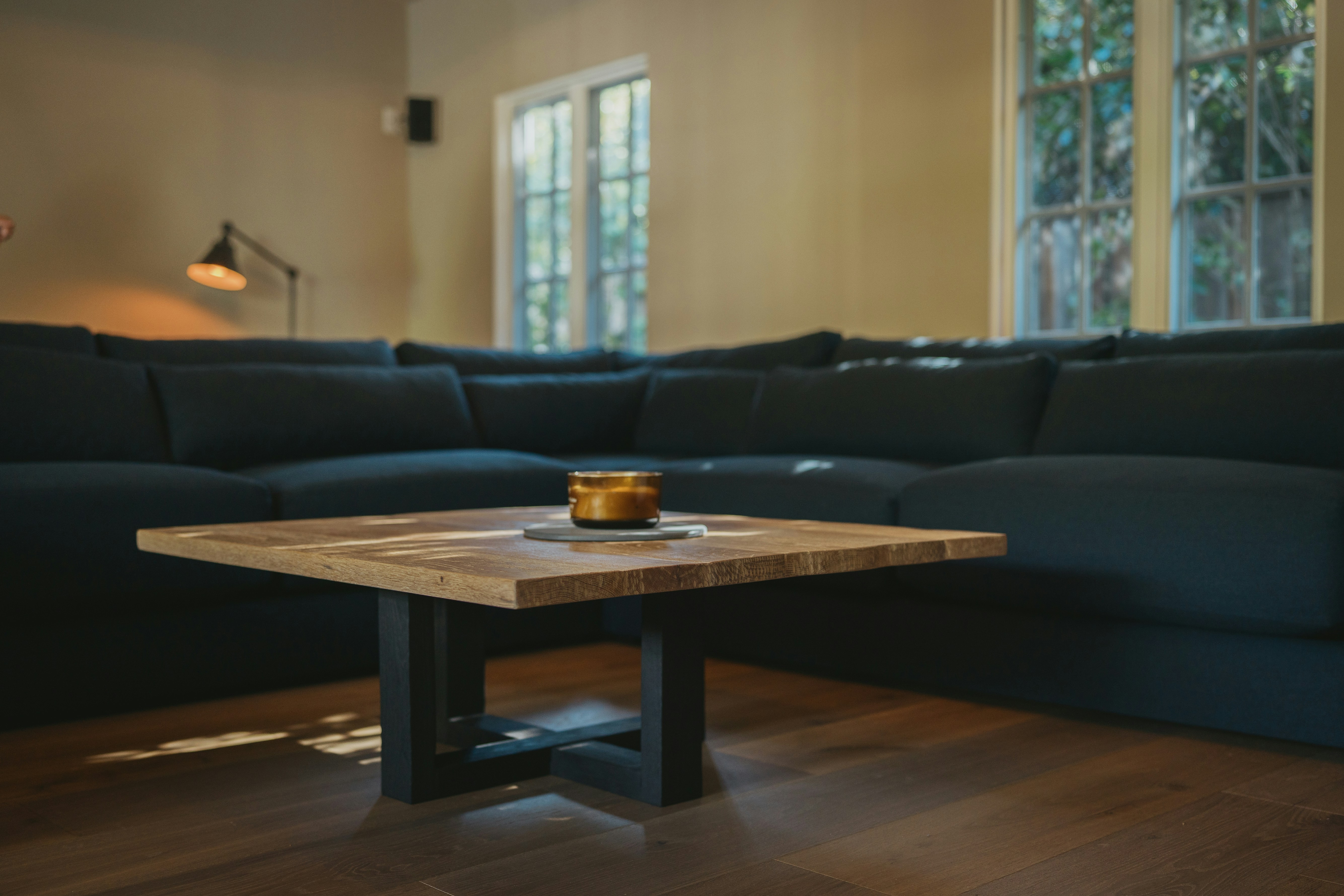Minimalist Coffee Table Centered Under Ambient Window Light