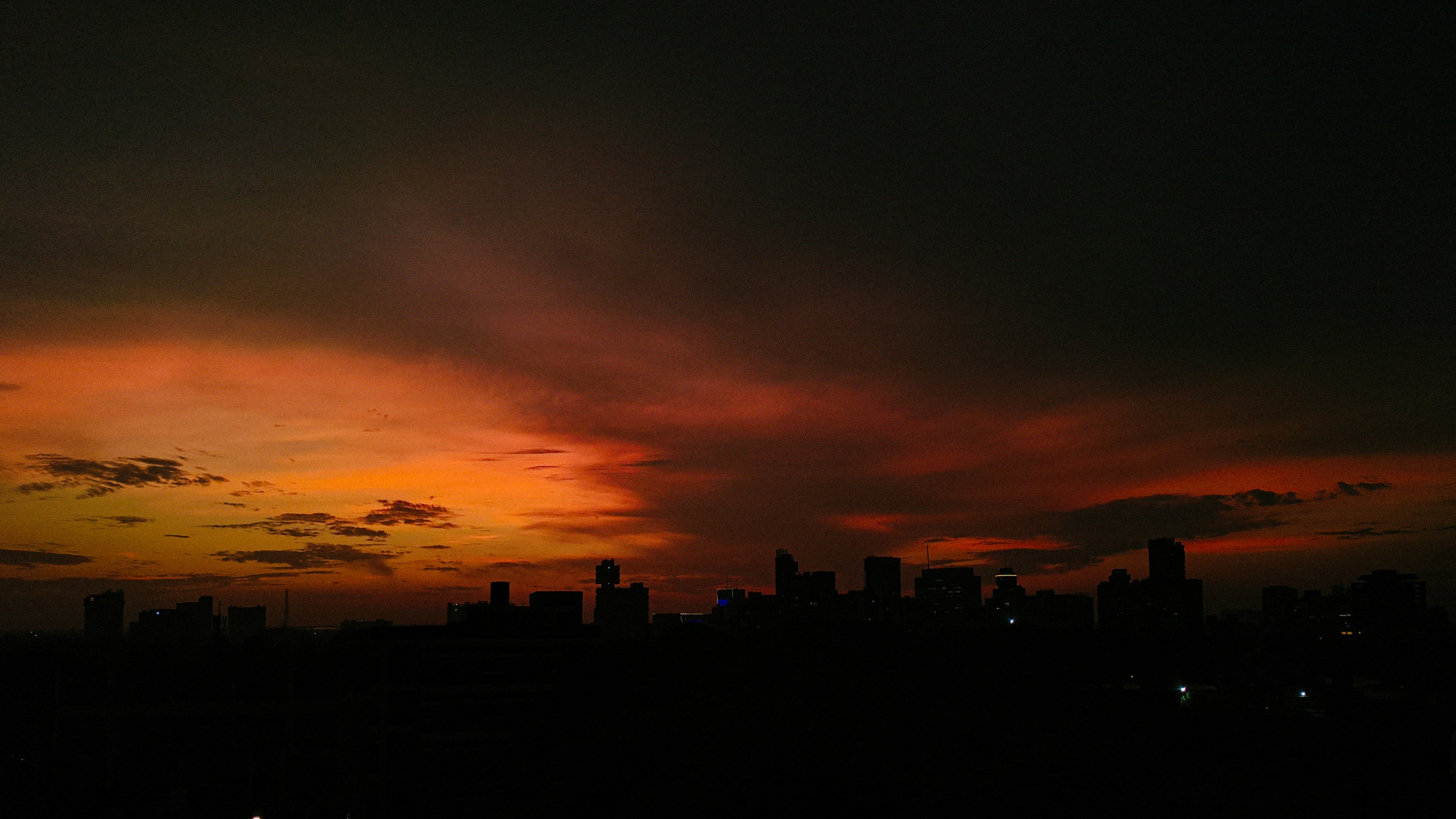 Sunset Ascending Over a Quiet City Horizon