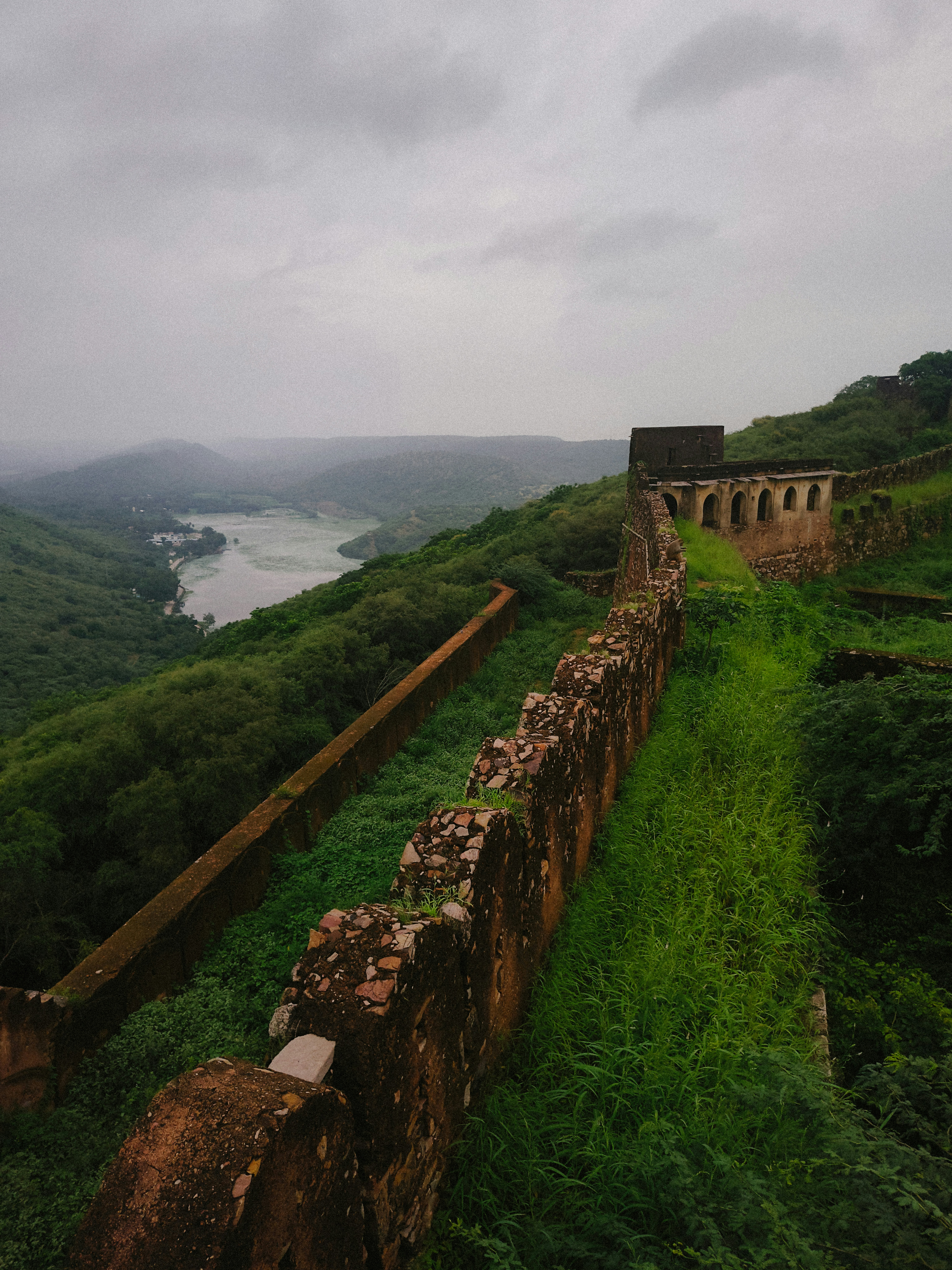 Ruin on the Ridge: Ancient Walls Stretched Along a Green Valley