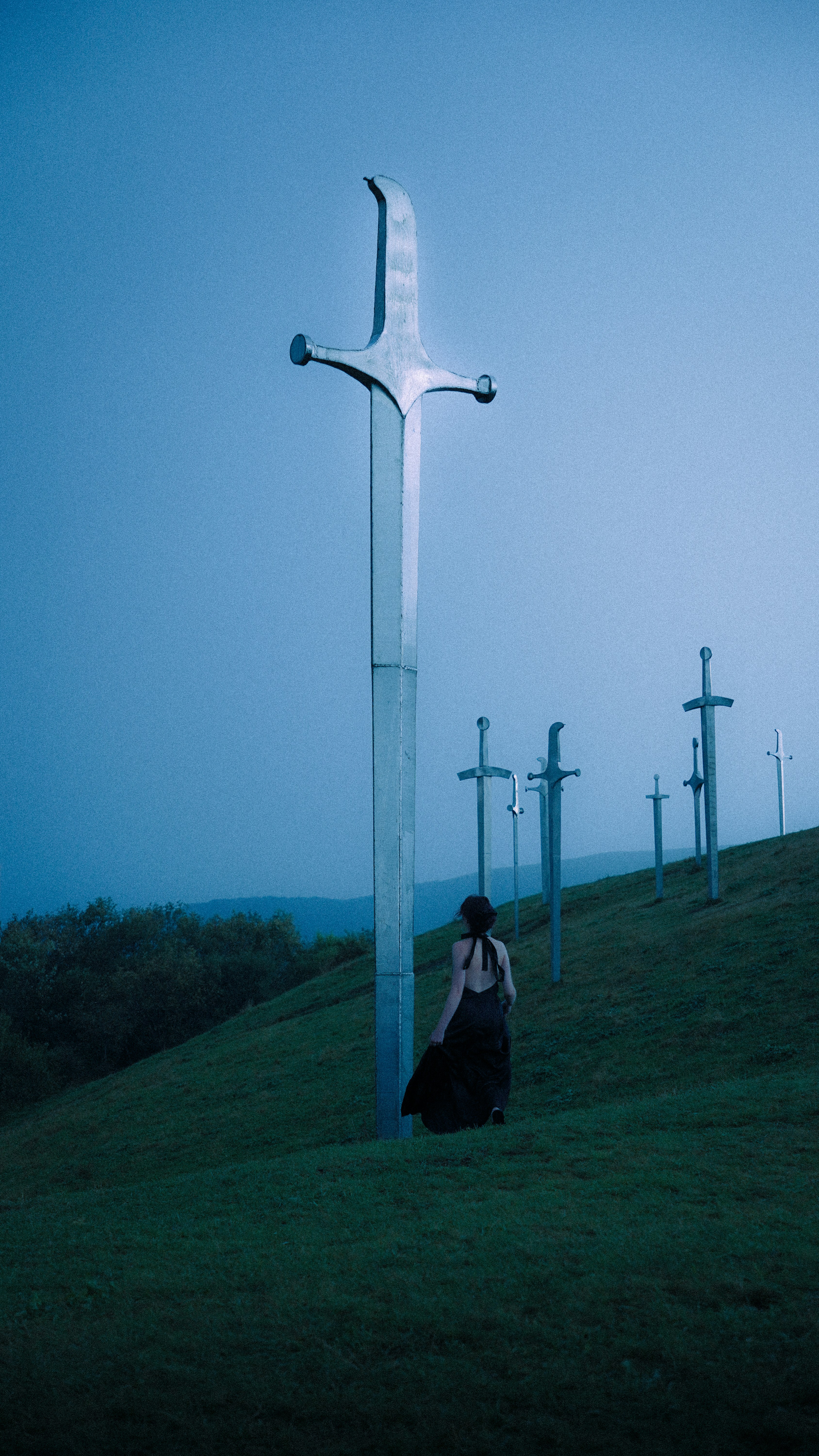 Swords of the Hill: A Line of Ghostly Crosses on a Quiet Slope