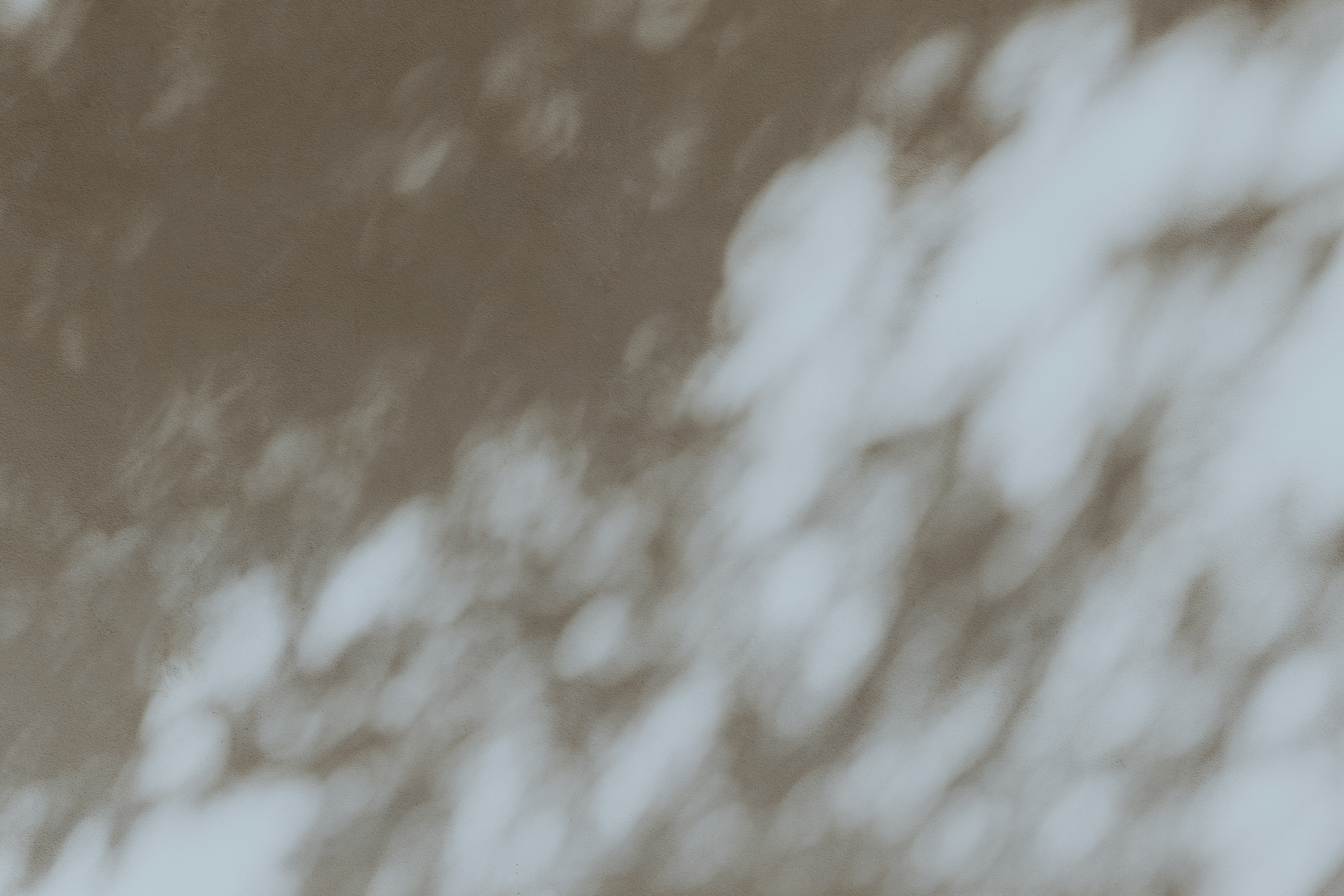 Blurred Drift: Soft Cloudy Texture in Sepia-toned Frame