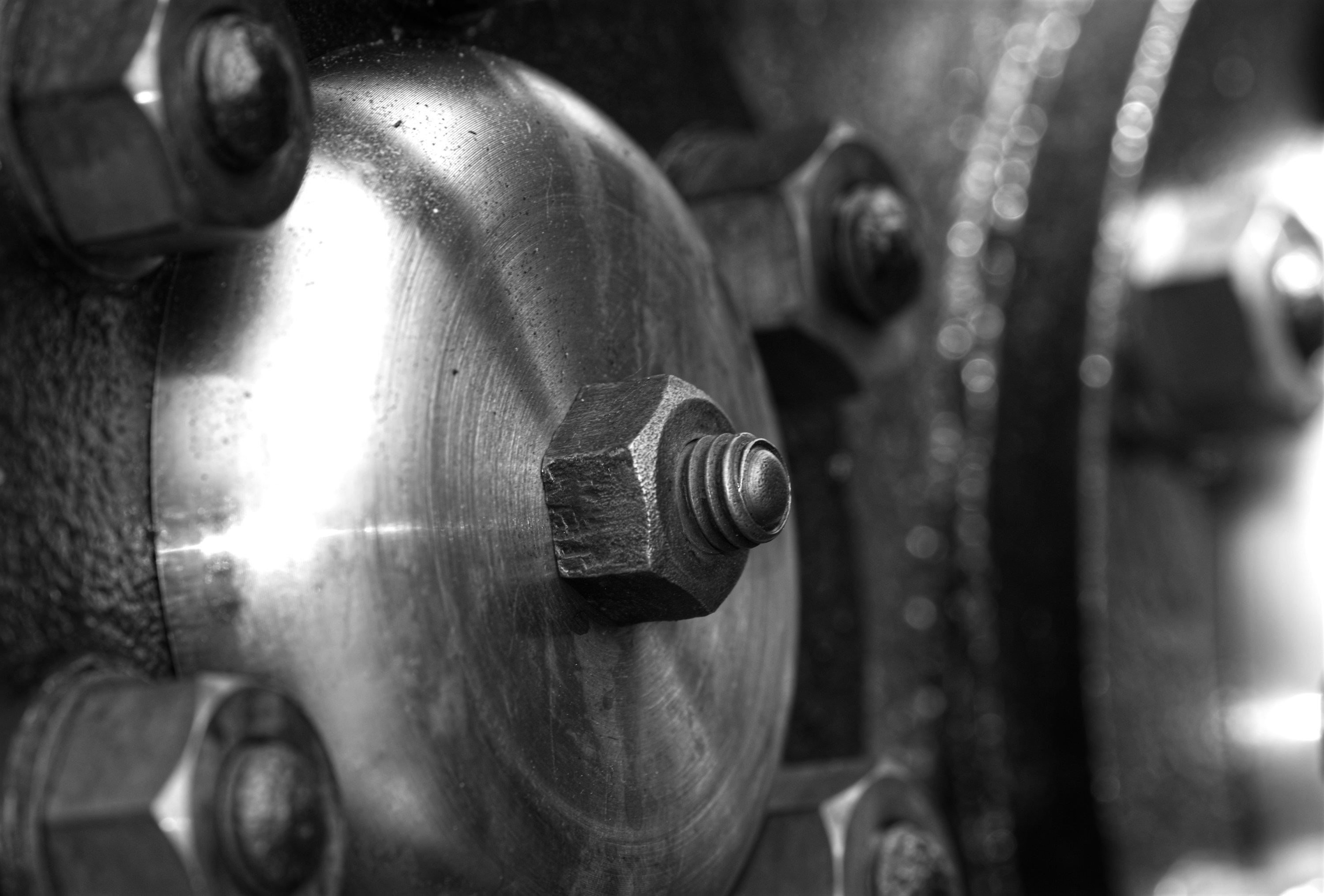 Close-up of a Precision Bolt on a Metallic Engine Assembly