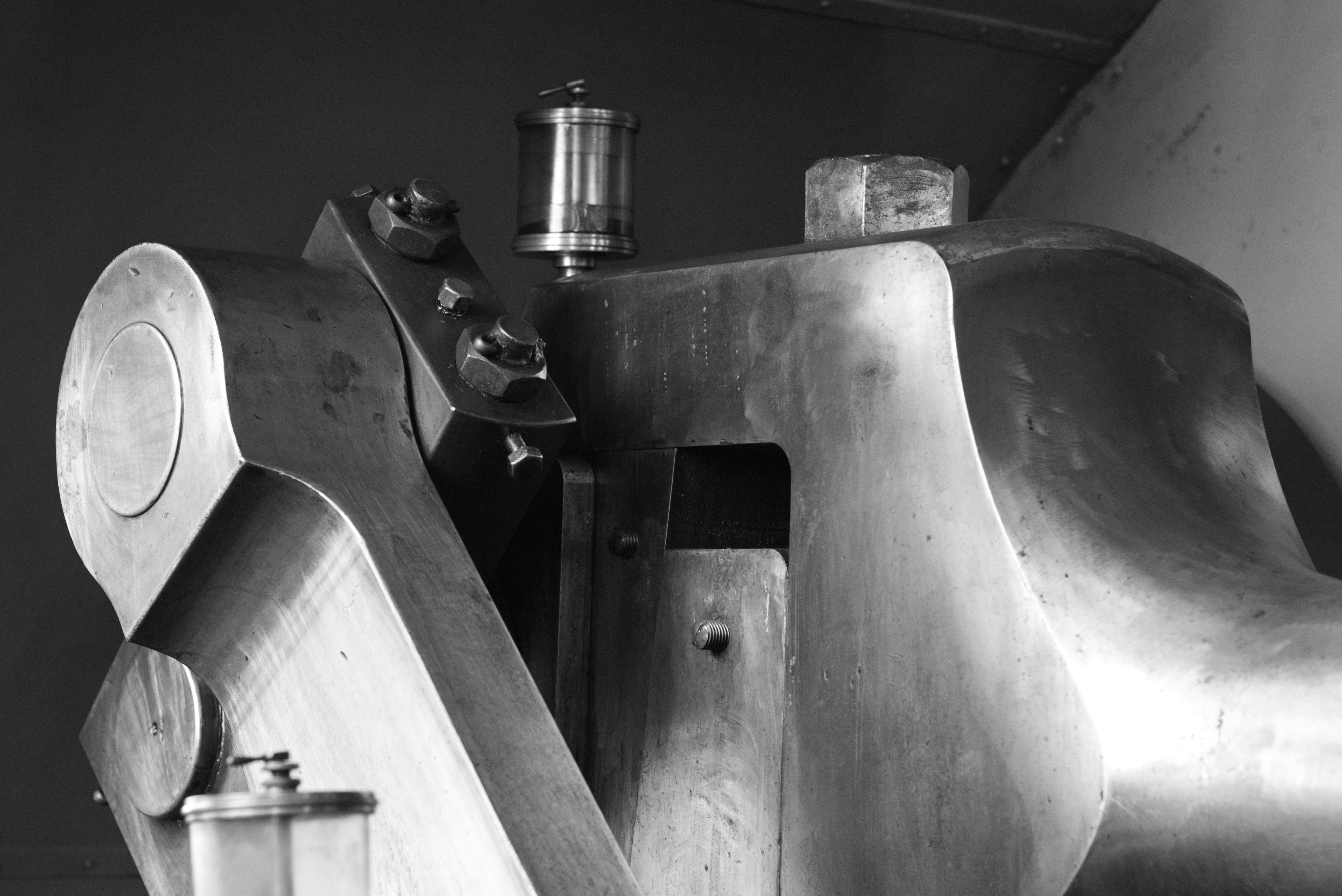Monolithic Machinery: A Close-Up of Steel Curves and Boltwork
