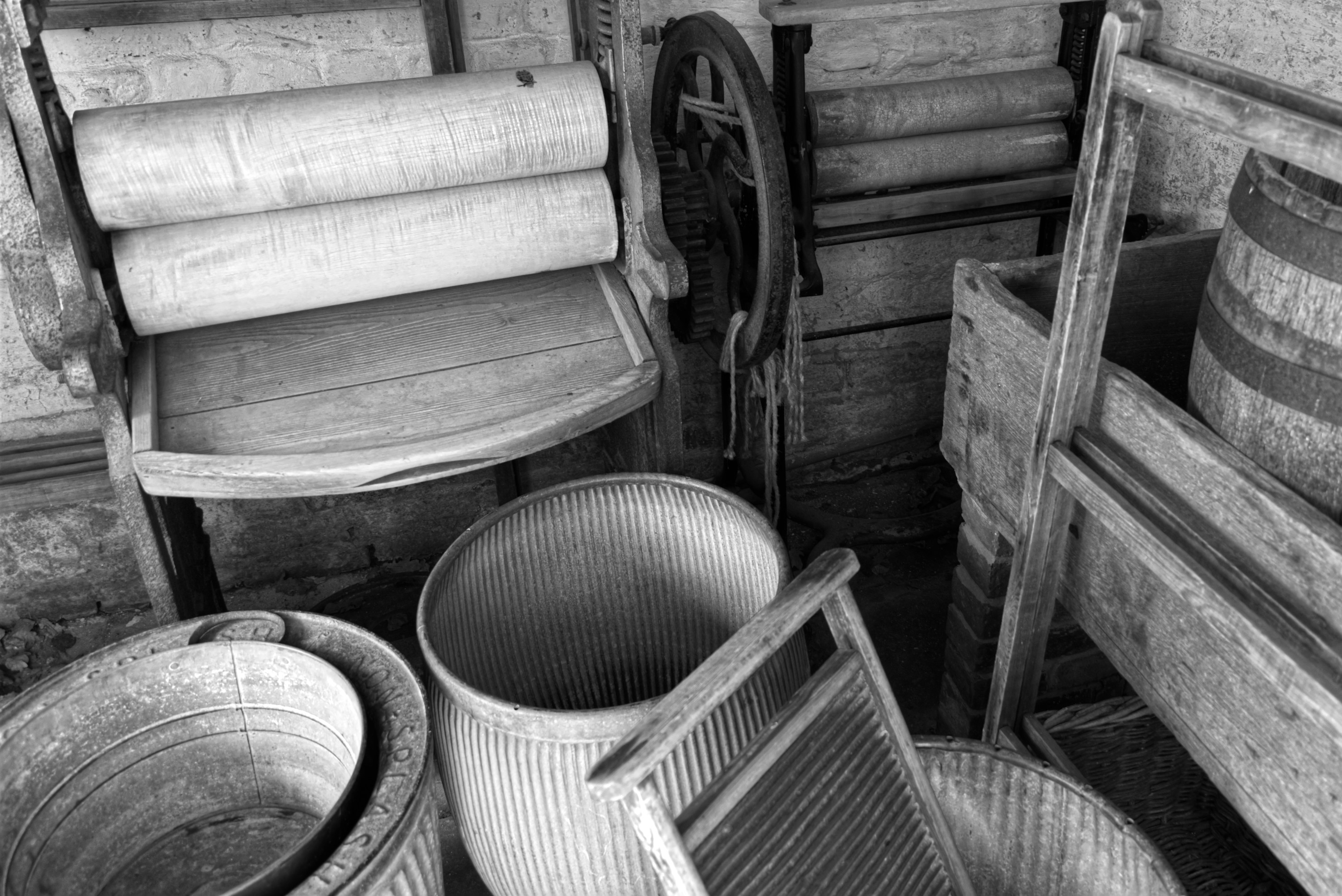 Dusty Workshop Still Life with Wooden Machinery and Metal Containers