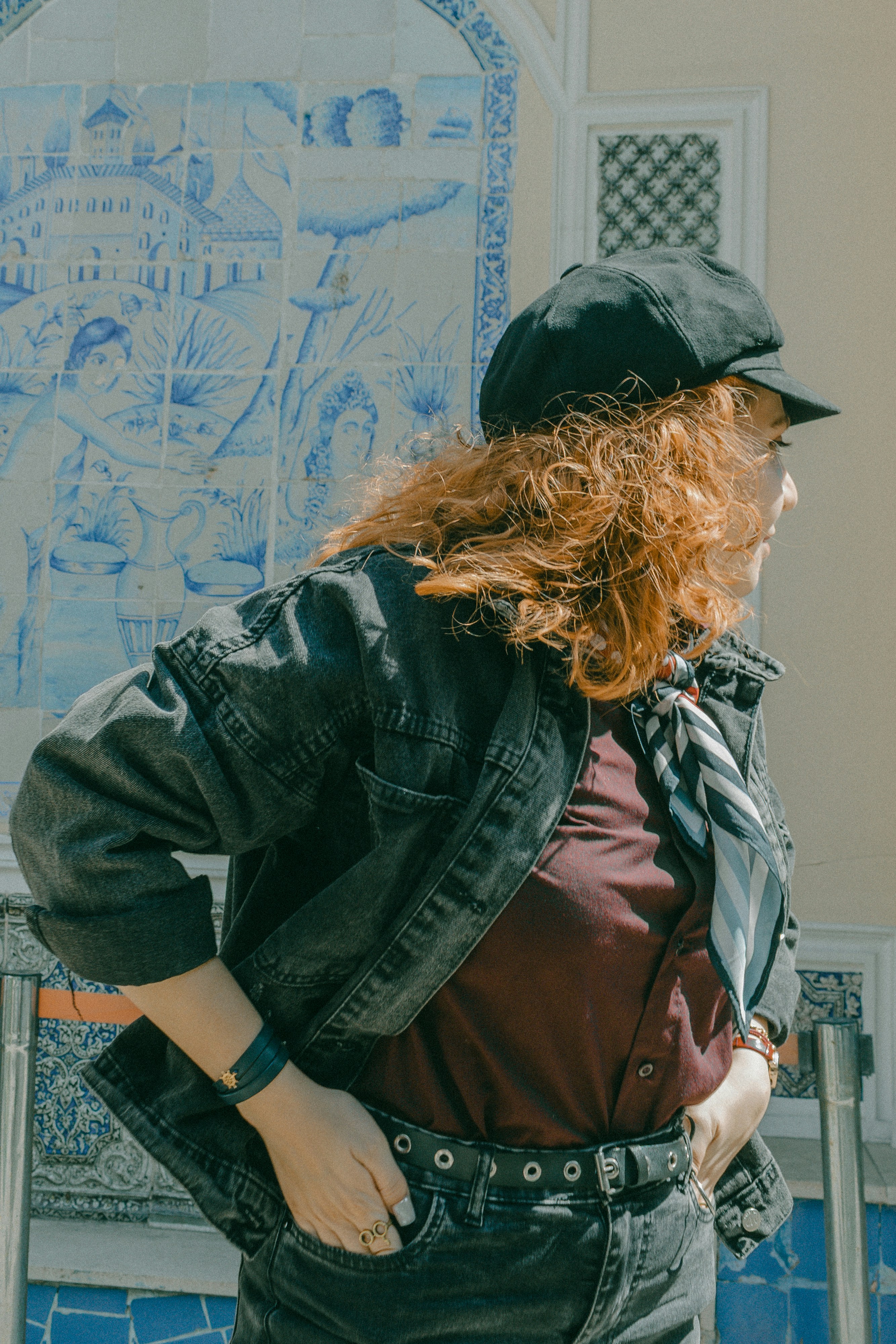 Heritage in Motion: a stylish street portrait with a vintage scarf and denim ensemble