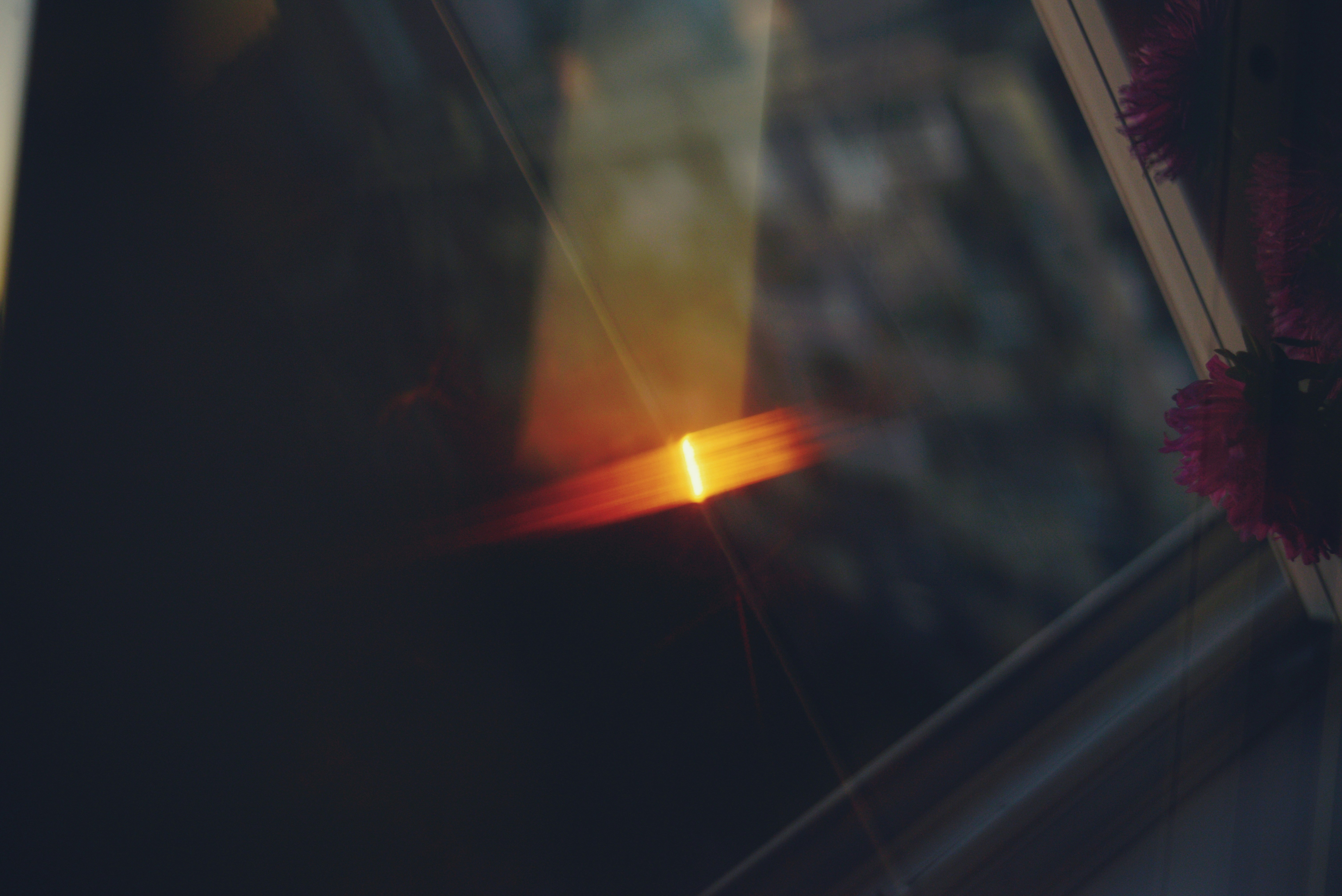 Glint at the Window Edge: A Quiet, Abstract Light