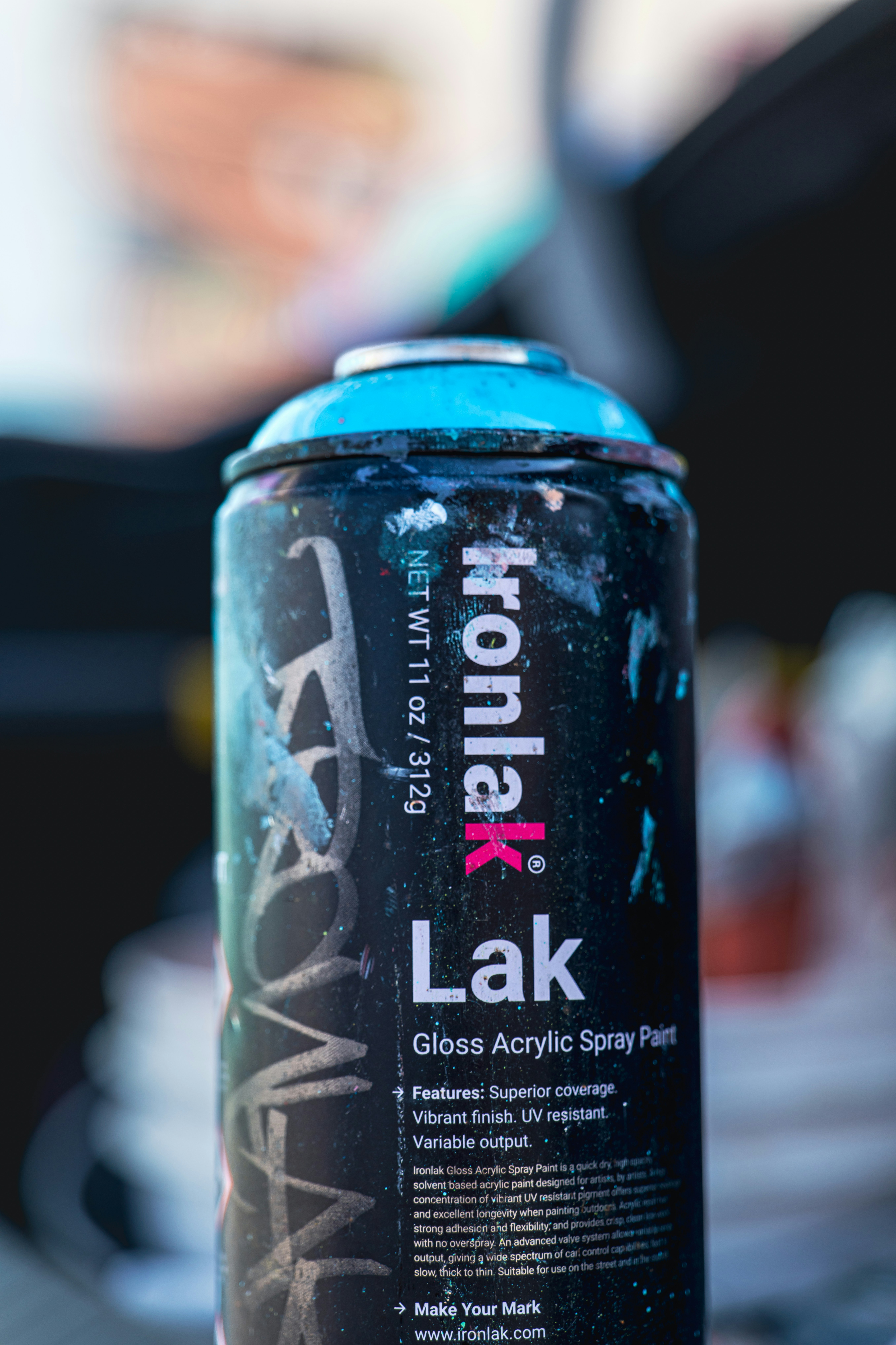 Ironlak Lak: A close-up of paint can with weathered label in studio glow