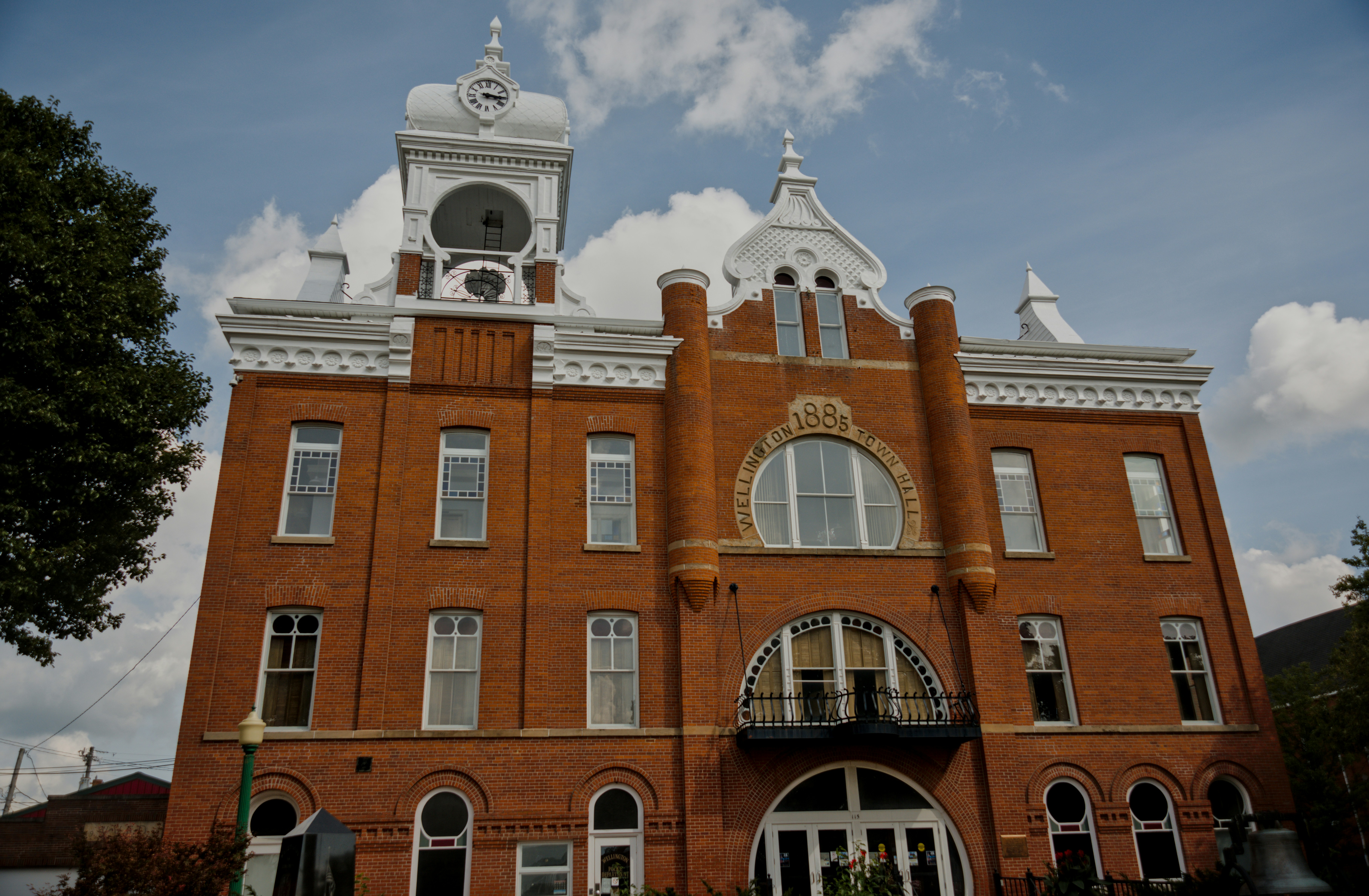 Brick Municipal Facade with Clock Tower and Archway