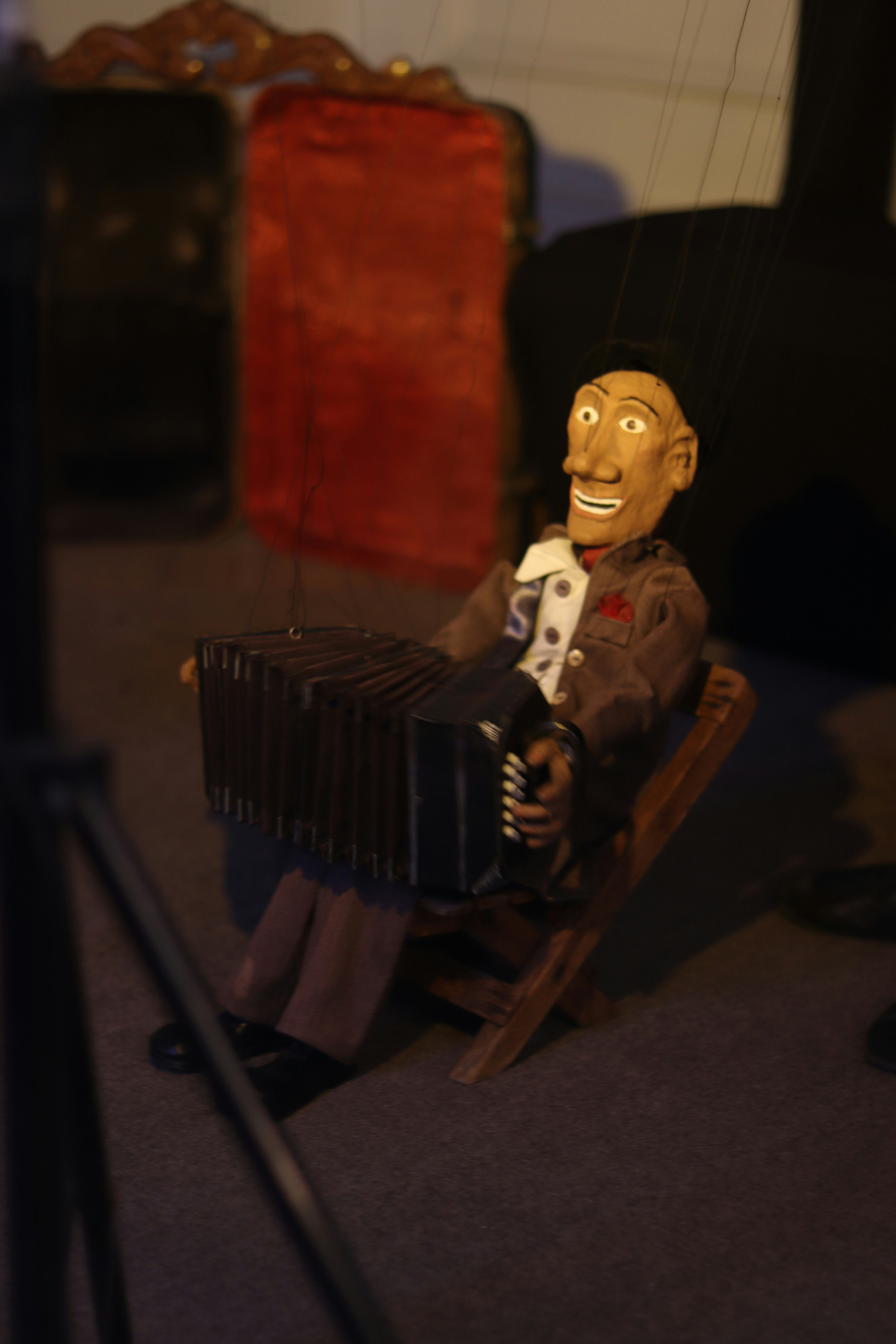 Marionette Melodies: A Cozy Night with the Accordion Puppet