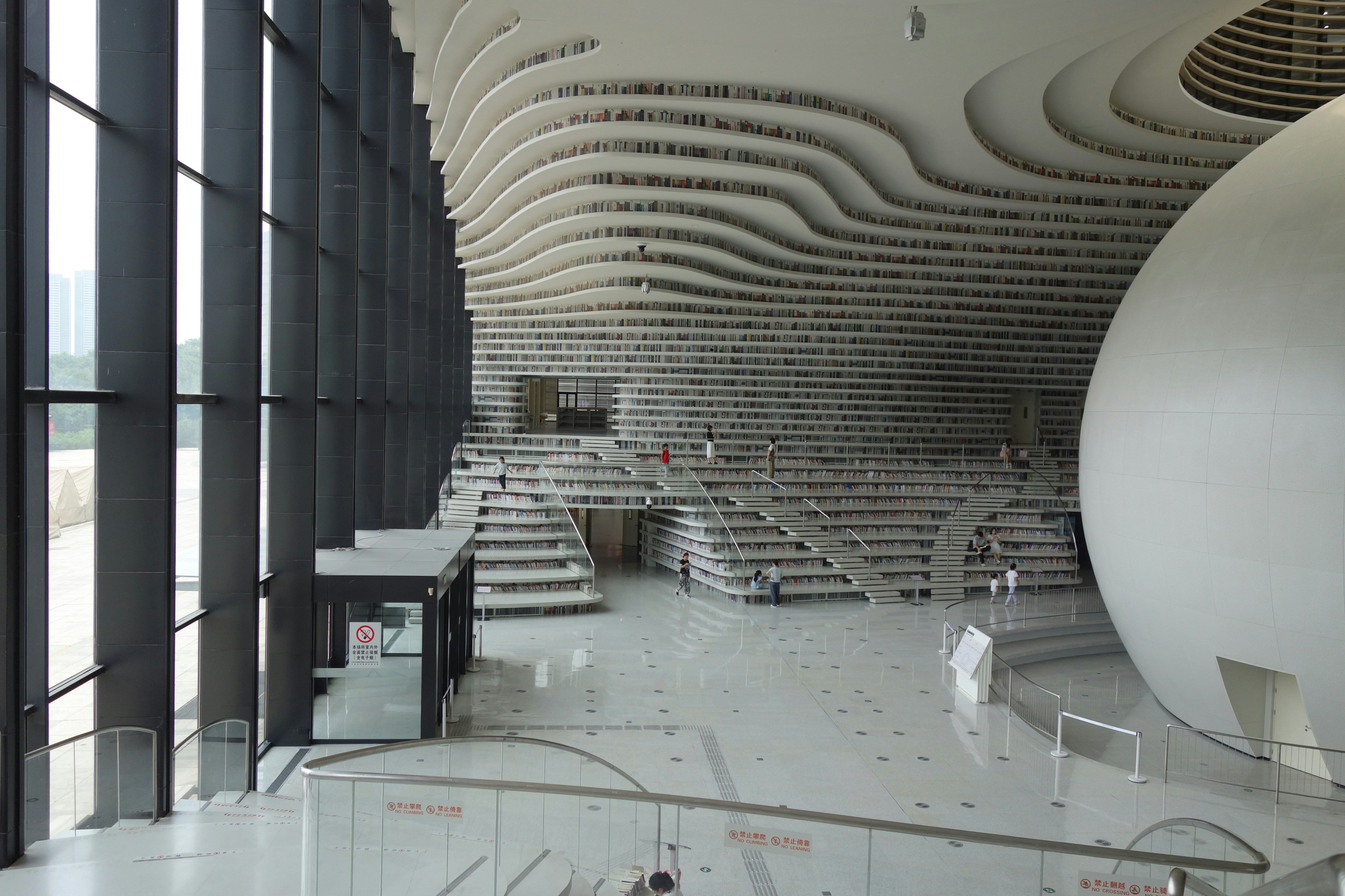 Echoes of Silence: The Grand Atrium with Curved Timber Ceilings