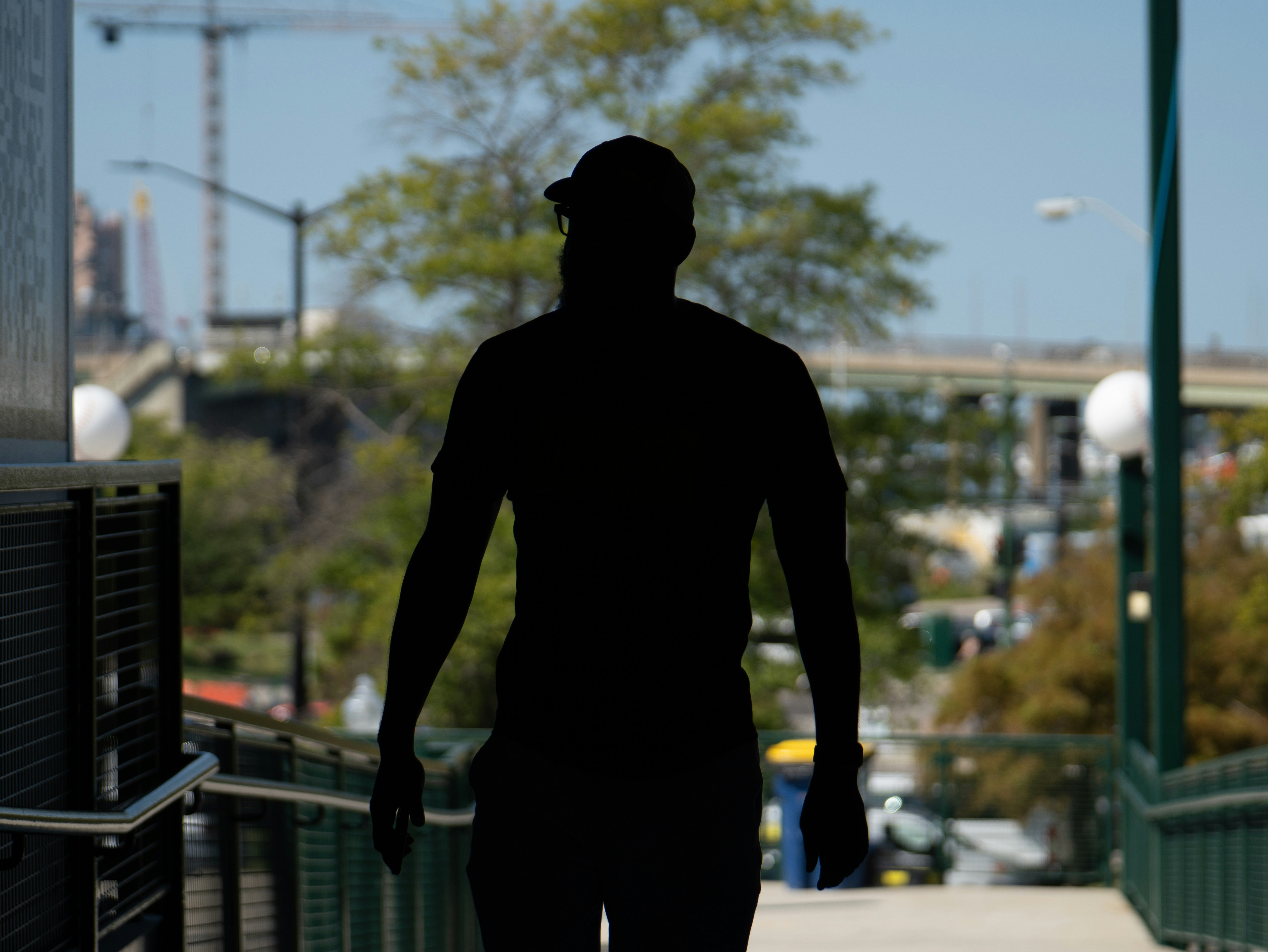 Silhouette Stance Under Urban Avenues