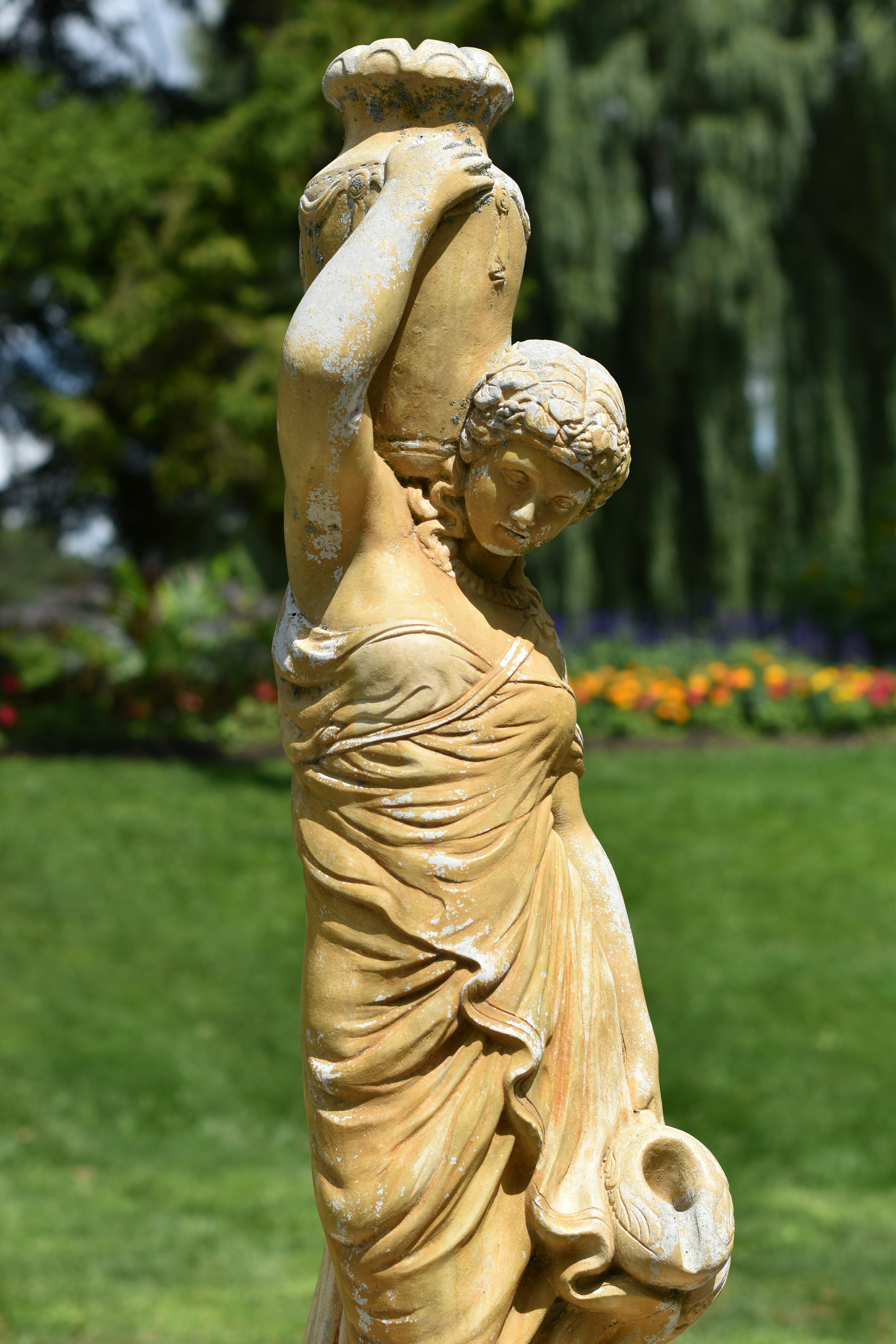 Lifters of Stone: Graceful Pose in a Garden Sculpture
