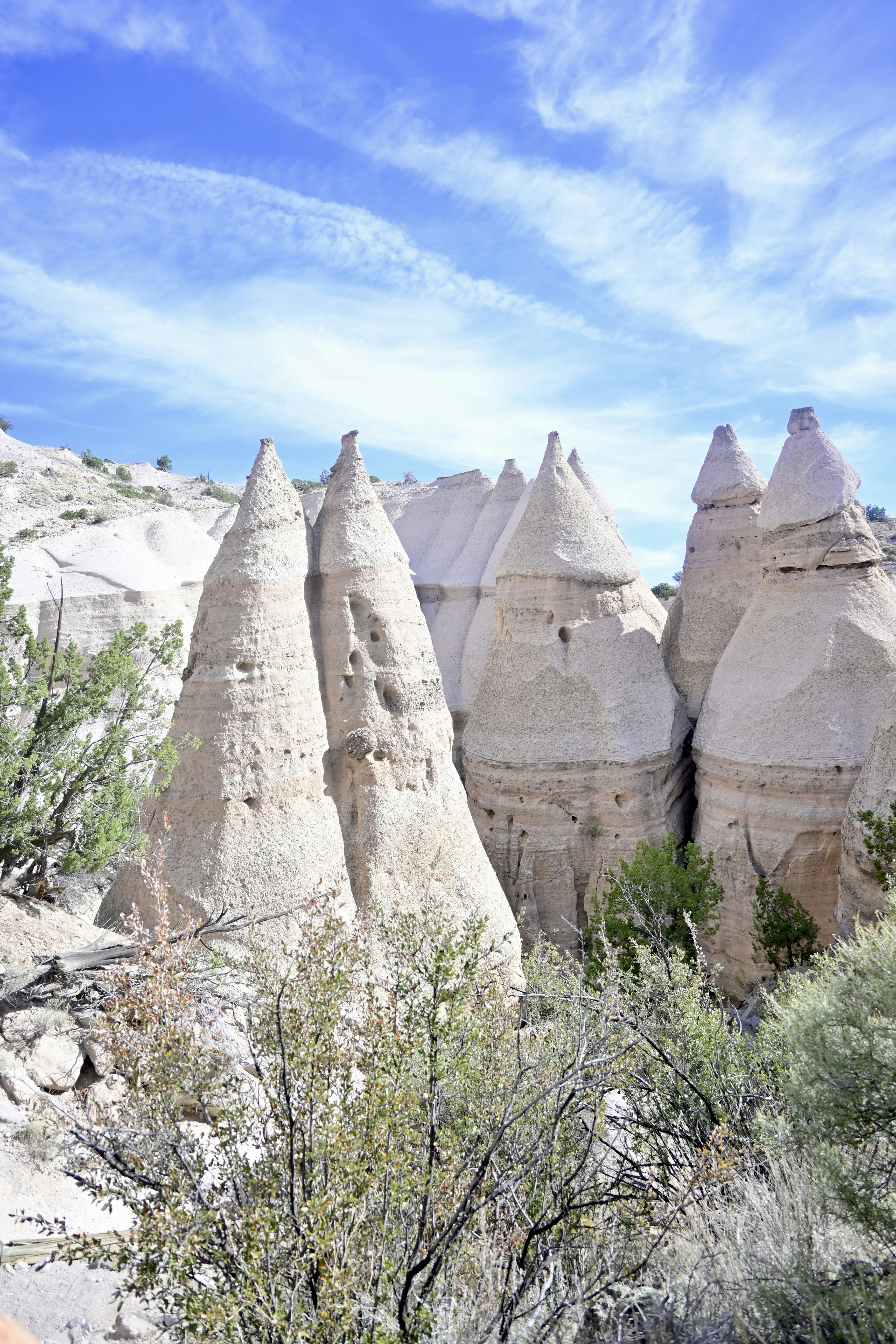 Towering White Echoes: Hoodoo Spire Field under a Cerulean Sky