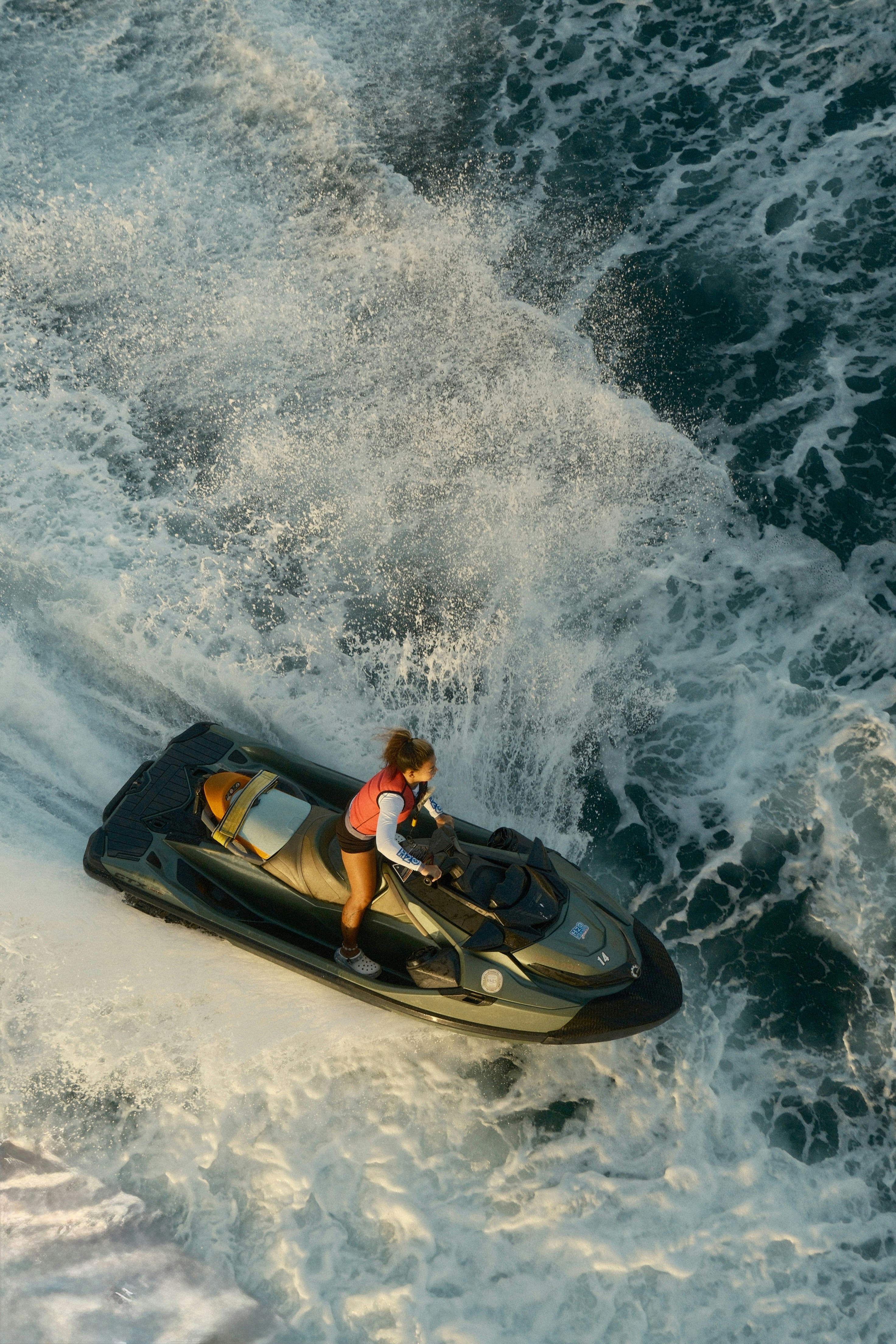 Jet-Ski Rider Carving Through A Tetrad of Waves