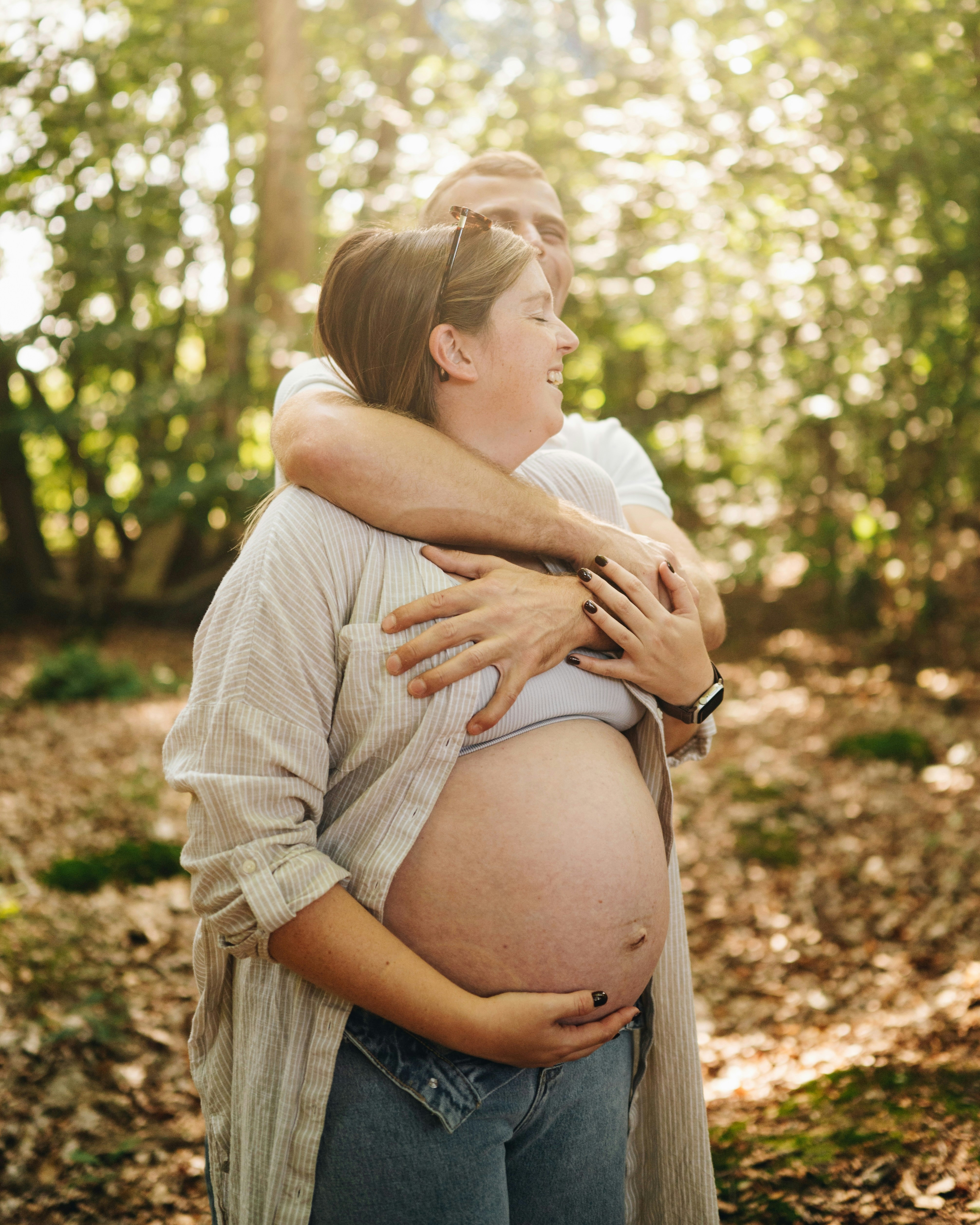 Embrace Under Dappled Light: Expectant Quiet Joy