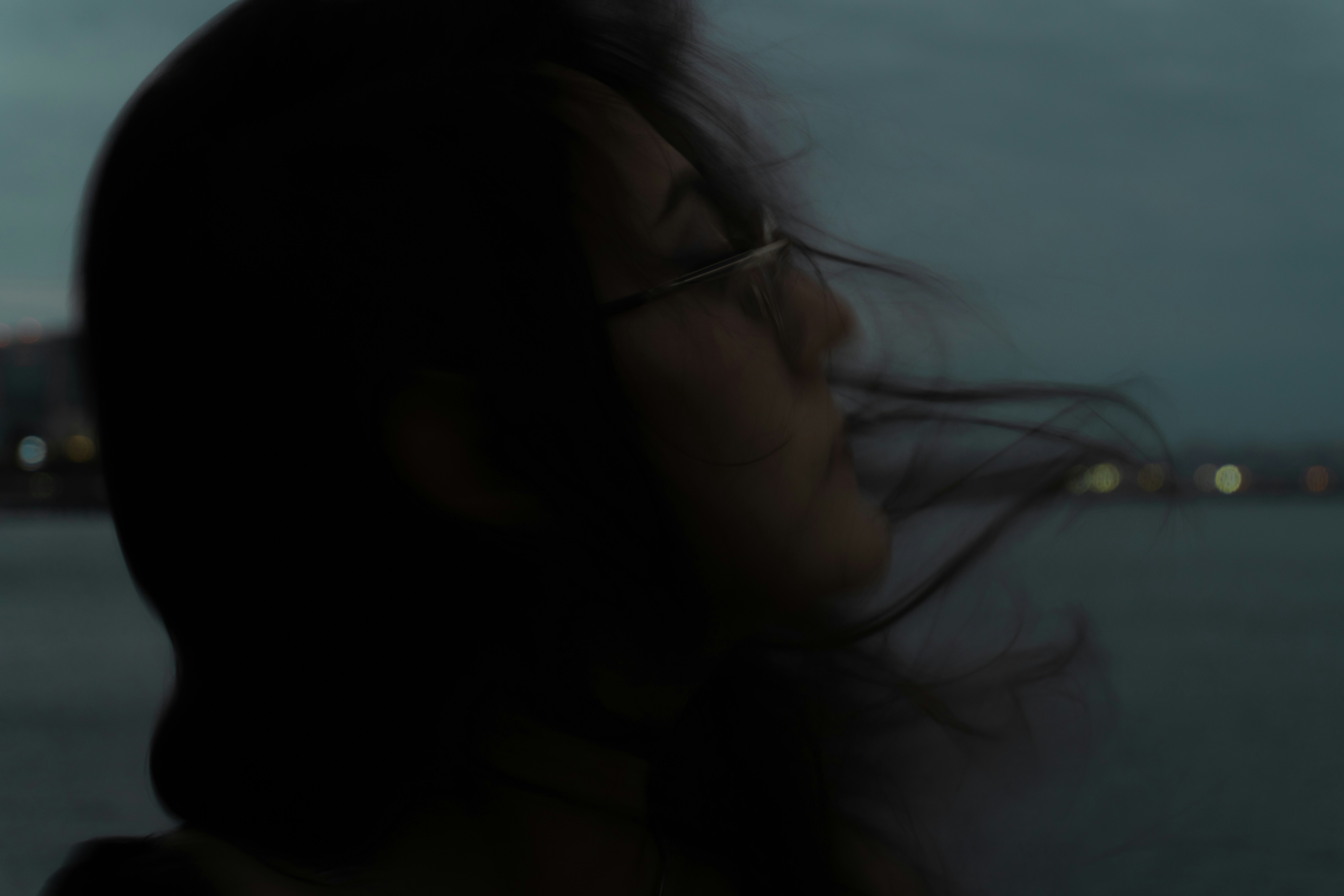 Moonlit Portrait: A Quiet Moment by the Water