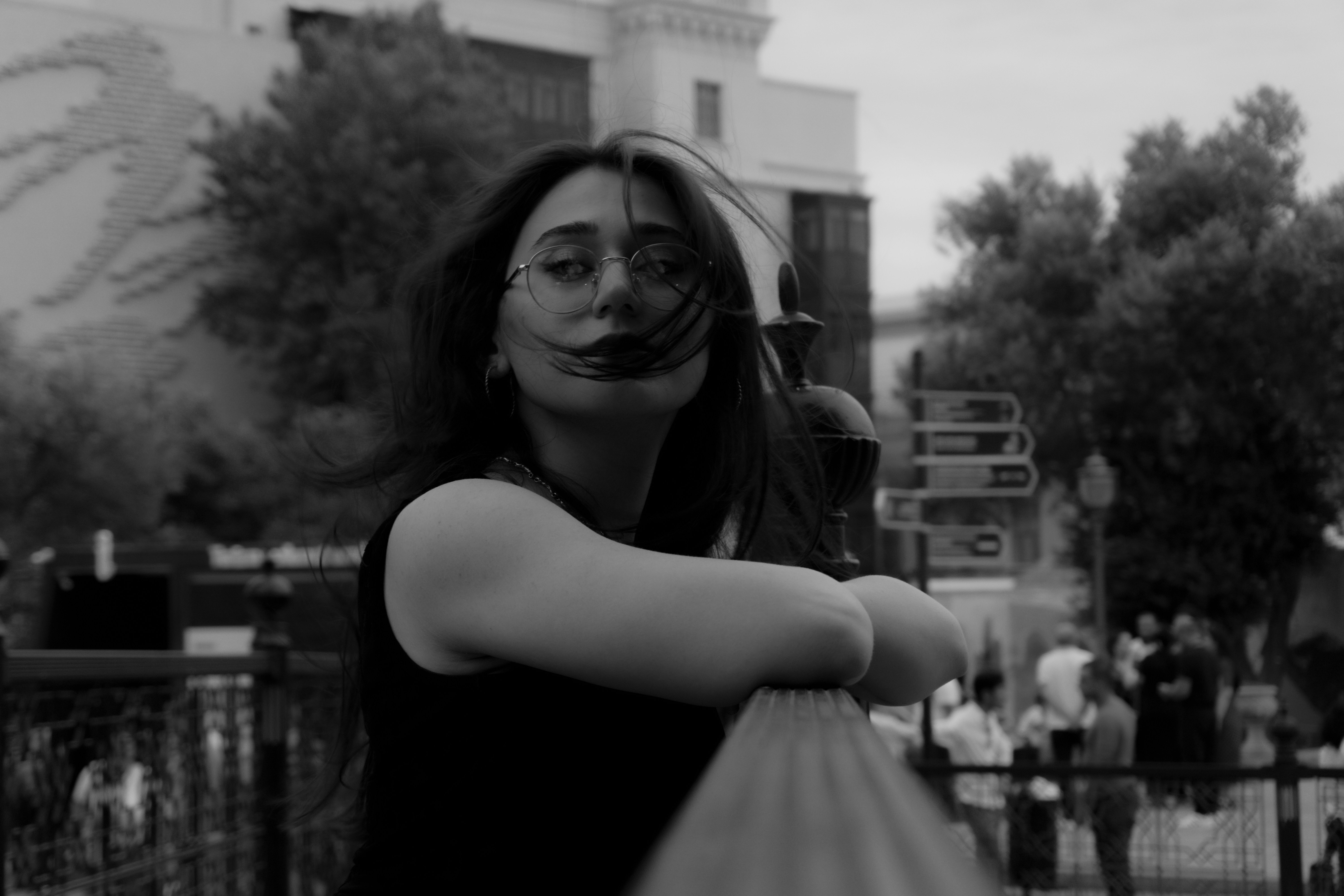 Portrait at the Railing: Quiet Confidence in Mono