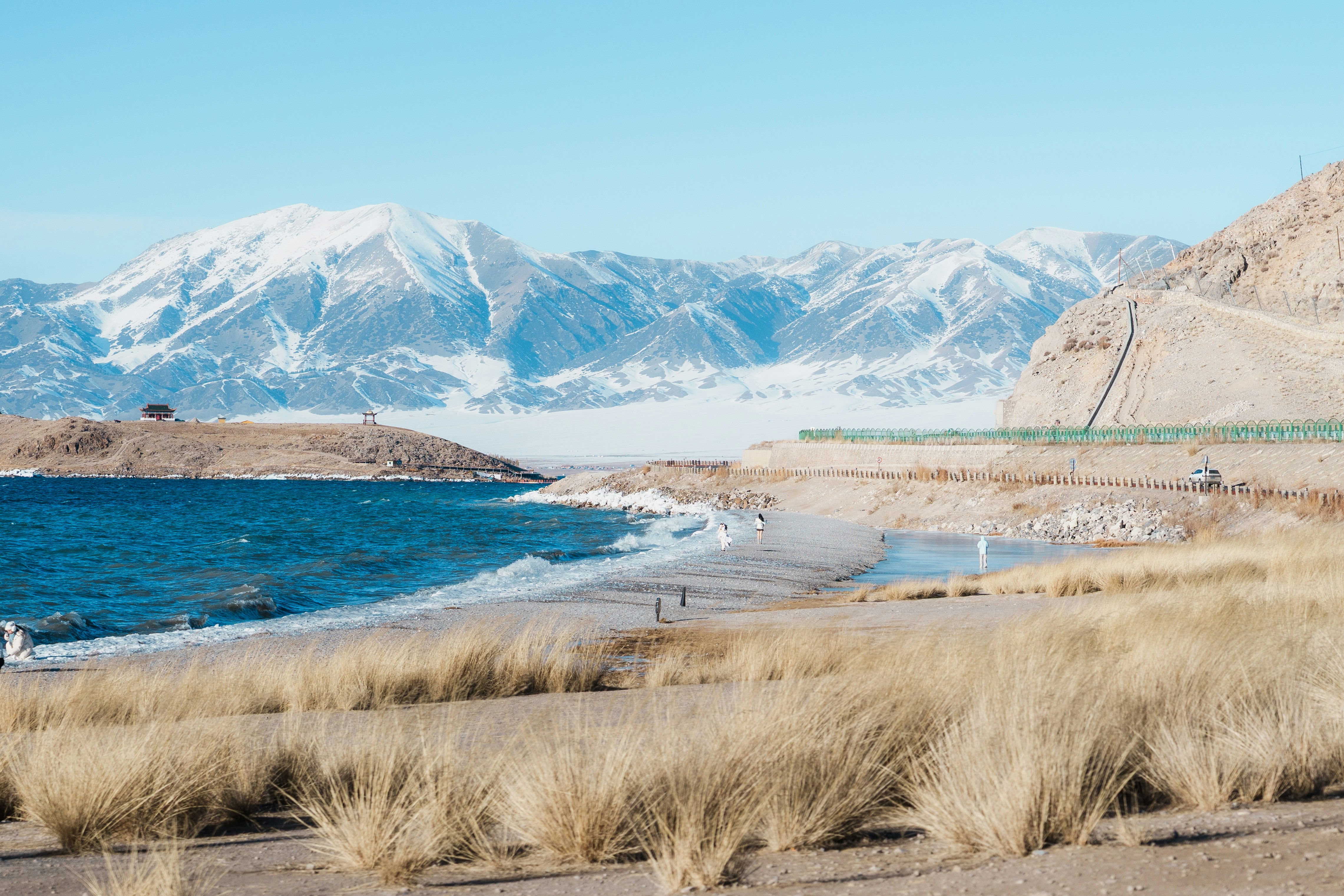 Coastal Dunes Facing Snowy Peaks