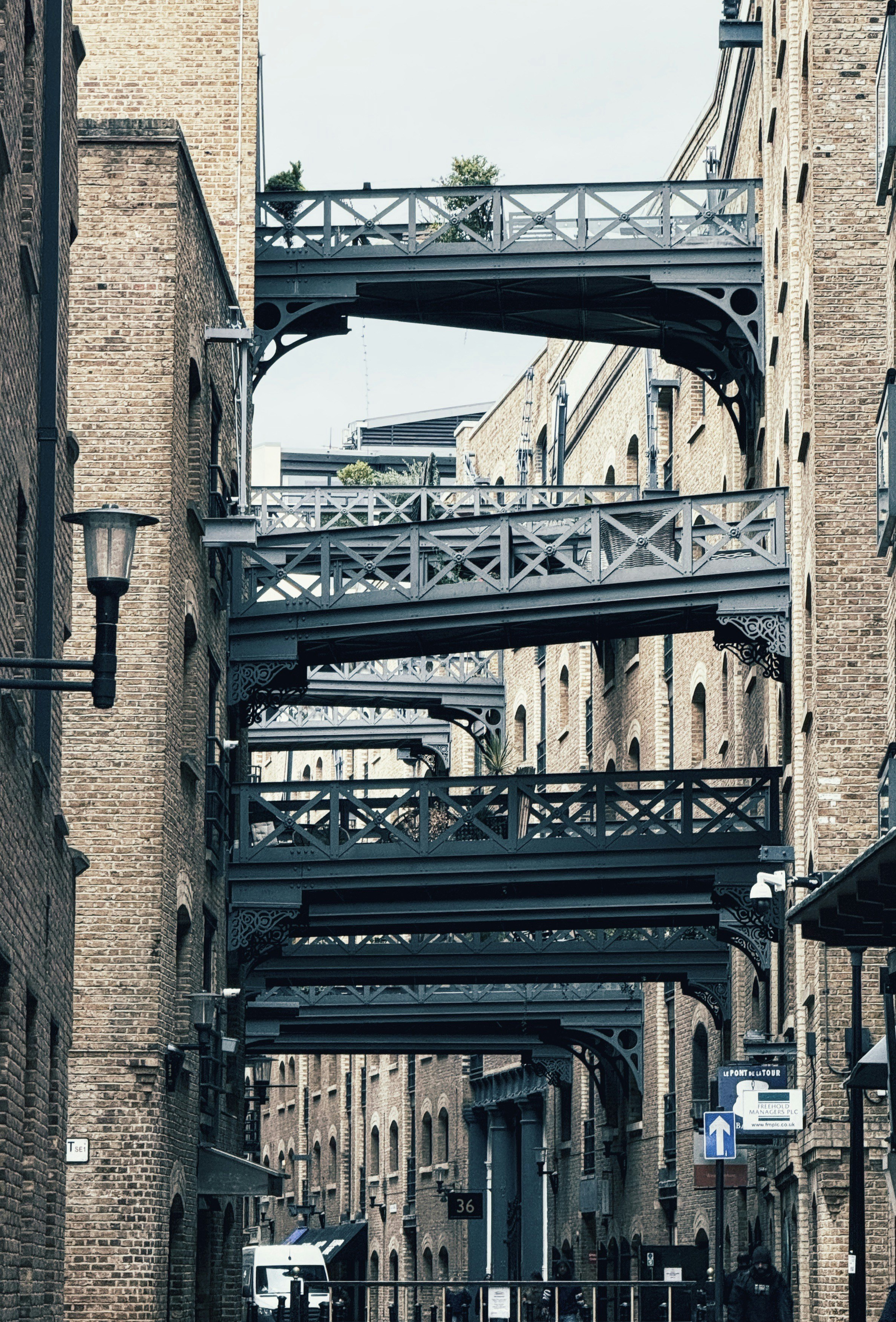 Ironwork Arcades: A Street of Bridges Between Brick and Sky